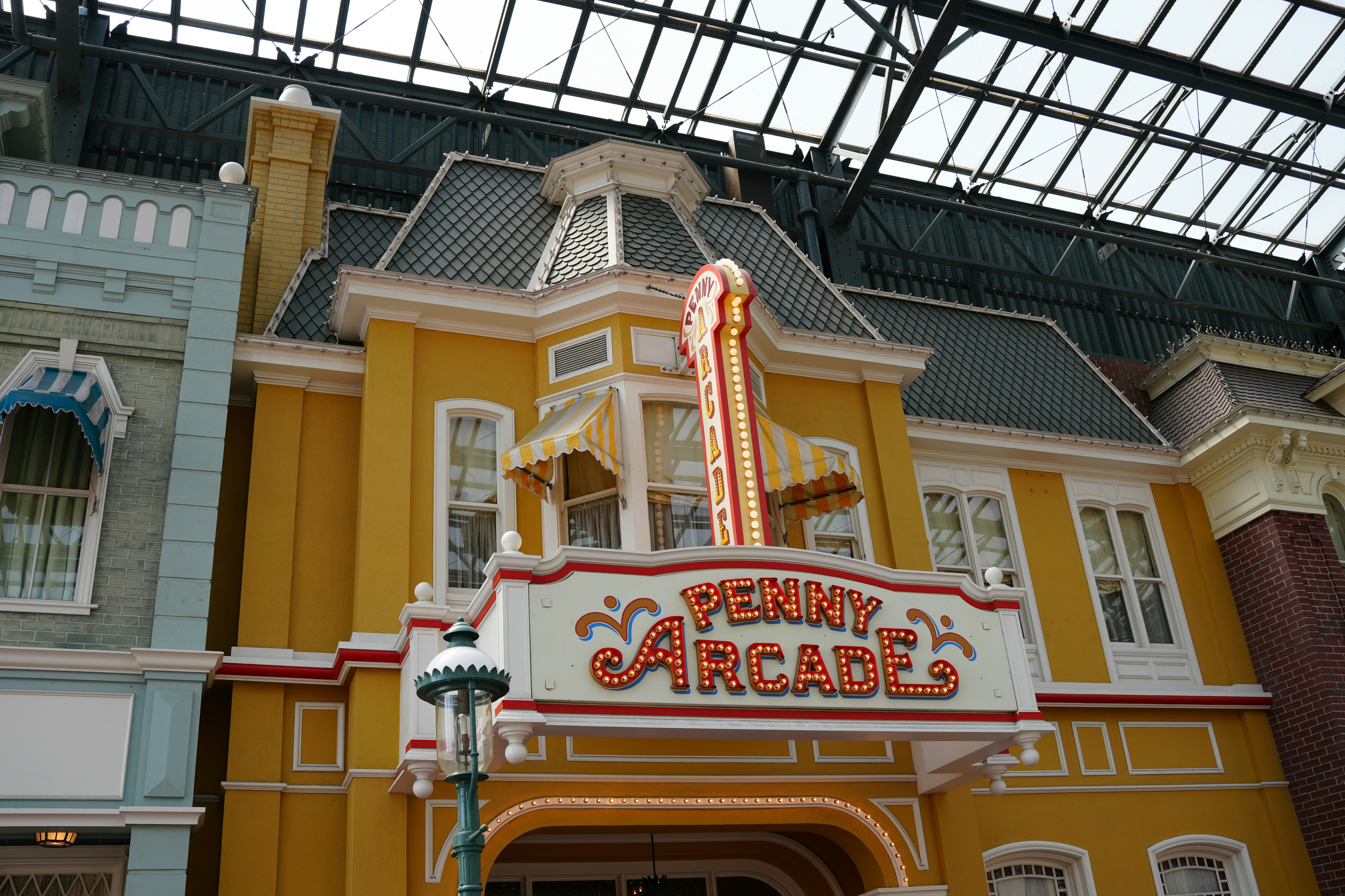 A building with a sign that says cherry arcade photo – Free Walt disney ...