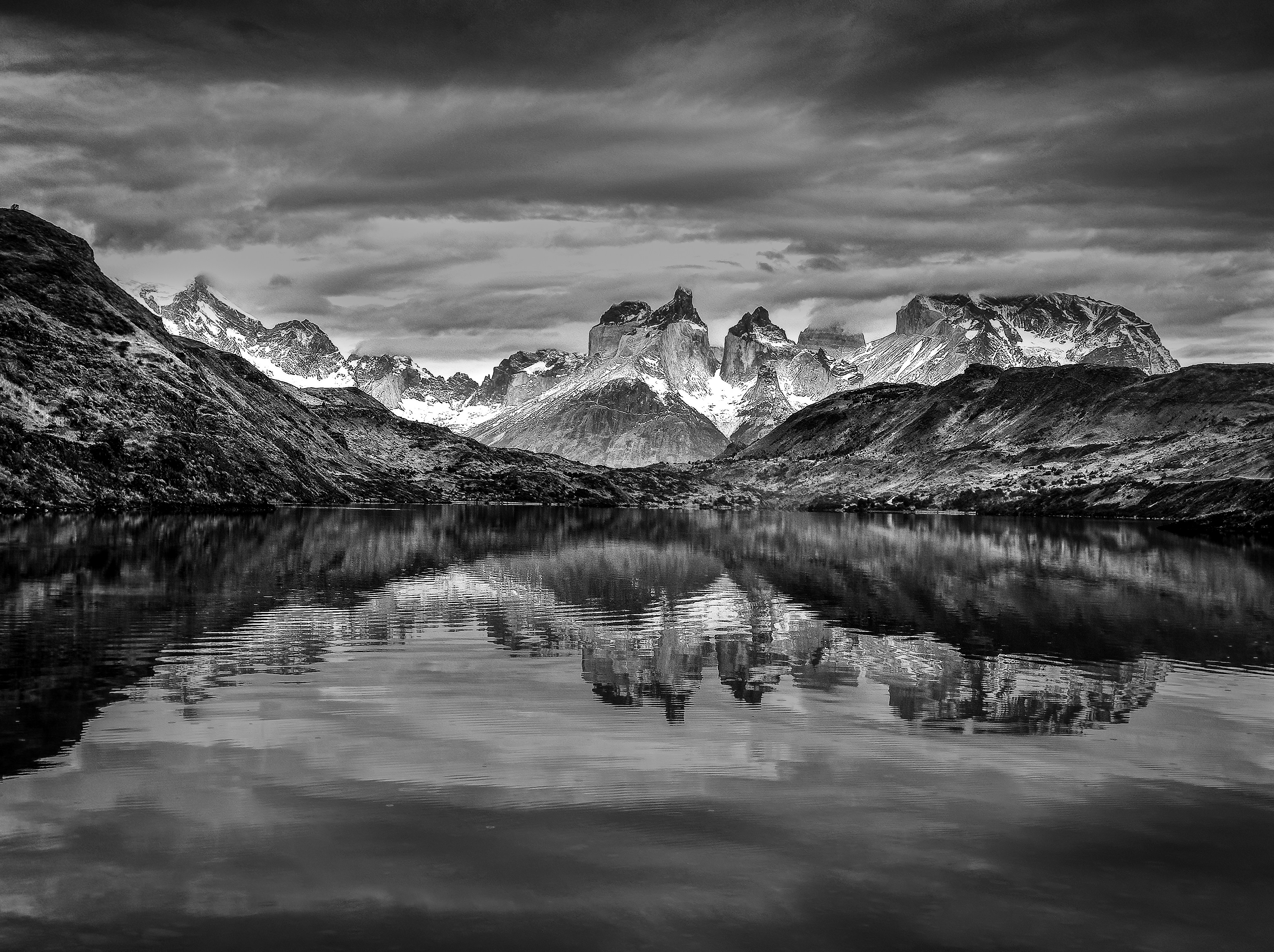 Monochrome Summit Reflections Over a Glassy Alpine Lake