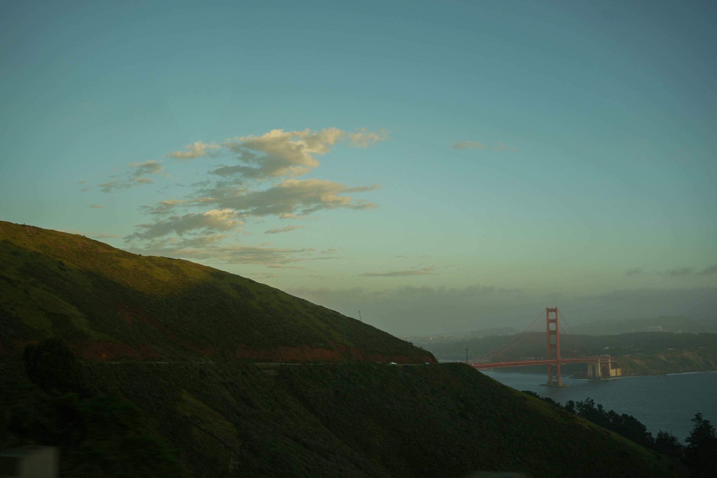 Soft Dusk Over Marin: The Golden Gate Bridge Emerging Through Hazy Light
