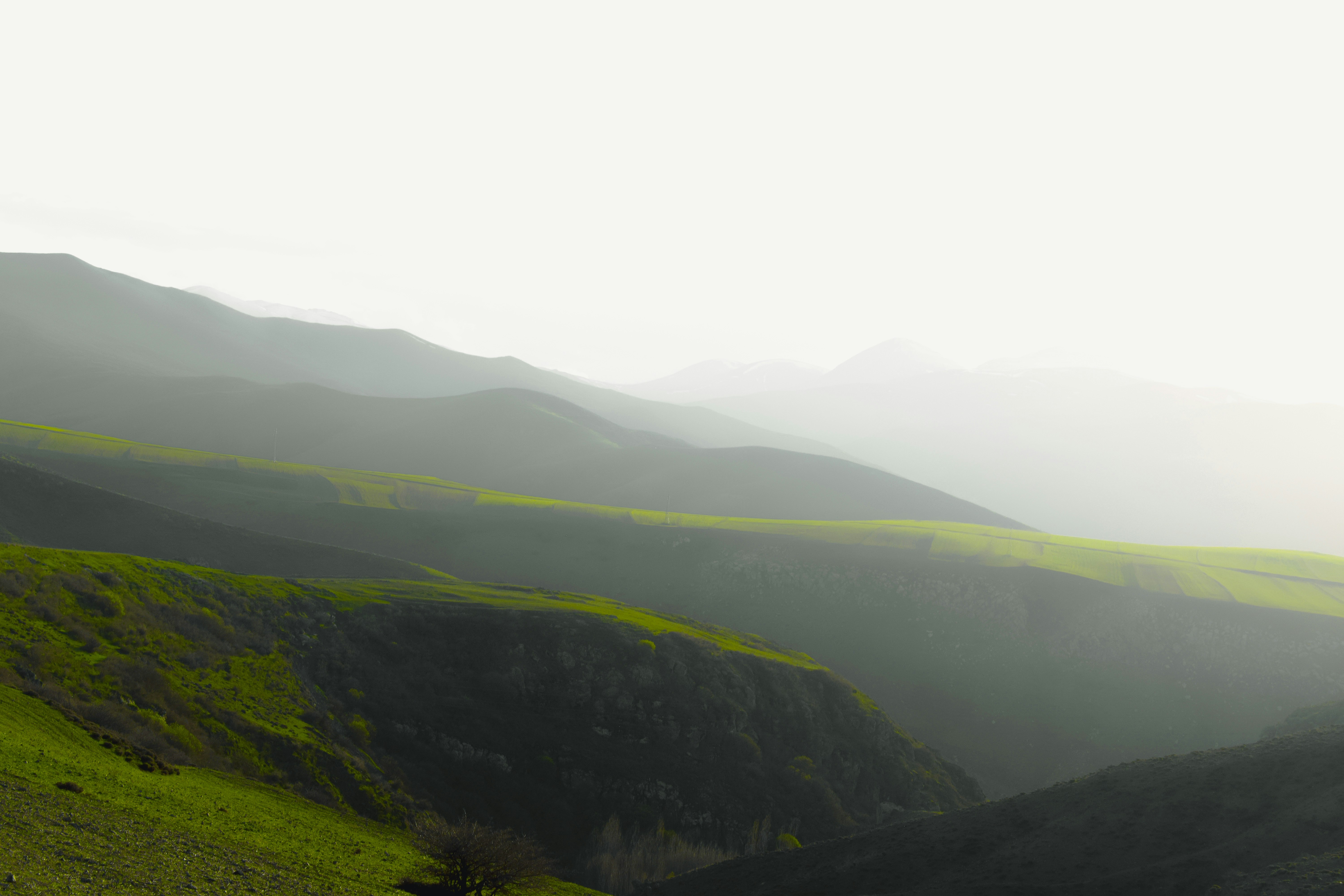 A green valley with mountains in the background photo – Free Kaleybar ...