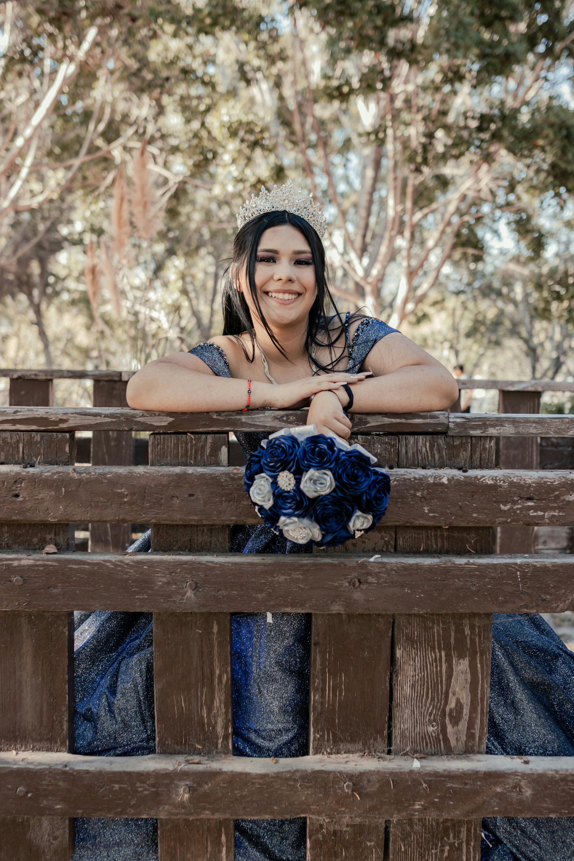 Sapphire Serenade: Portrait of Joy in a Rustic Blue Gown