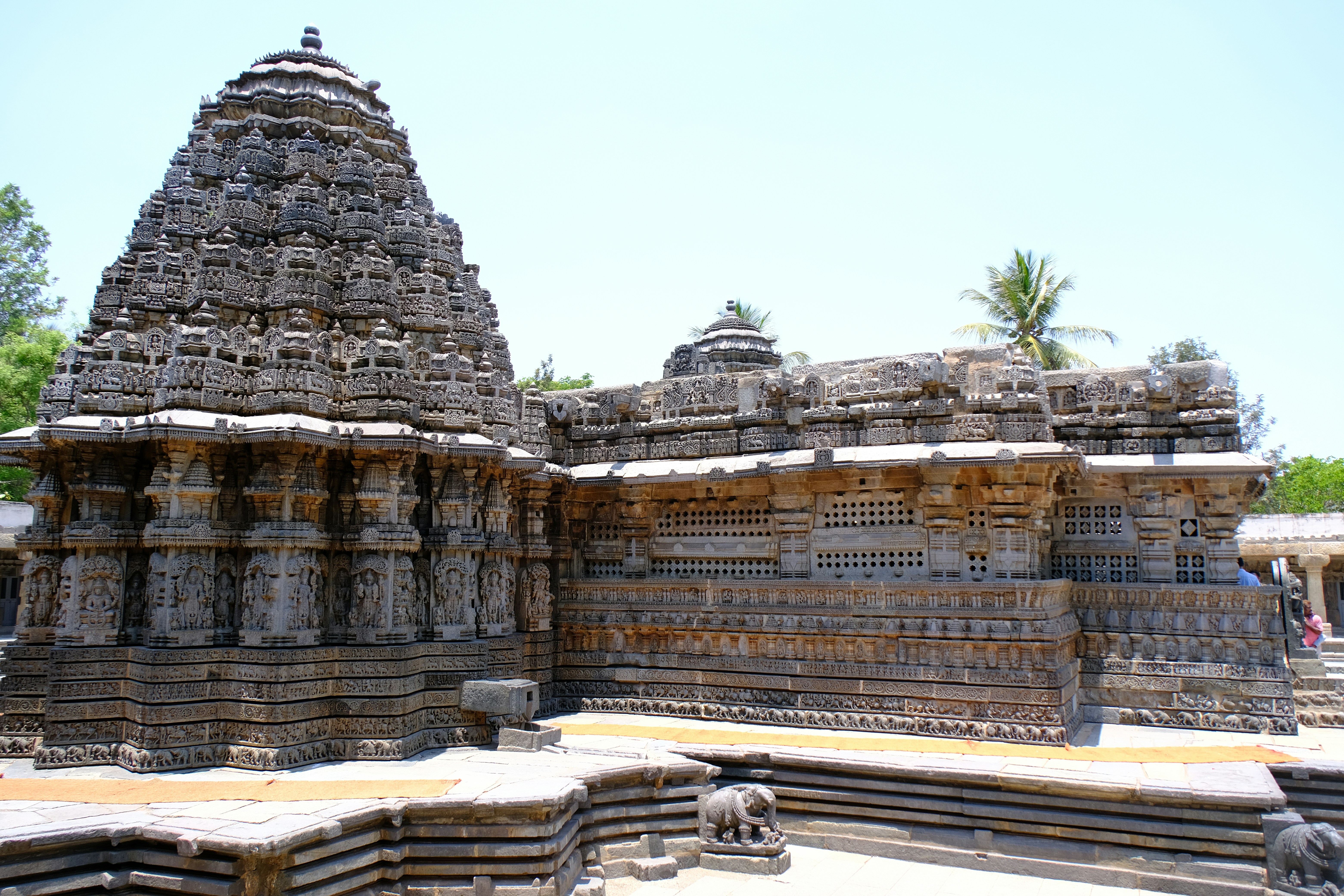 A large stone structure with sculptures on it photo – Free Karnataka ...