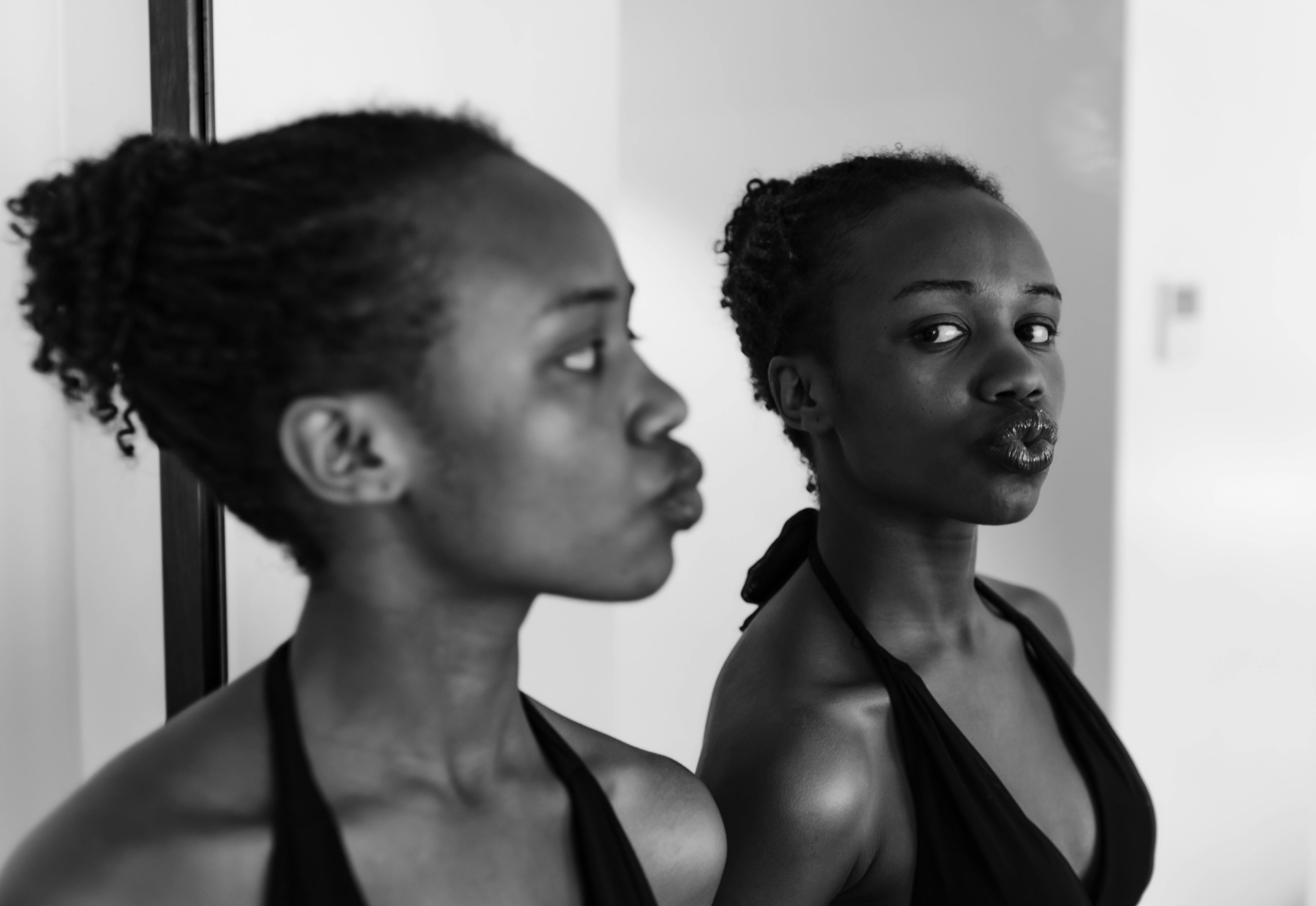 Echoes in Mono: A Dual-Profile Studio Portrait