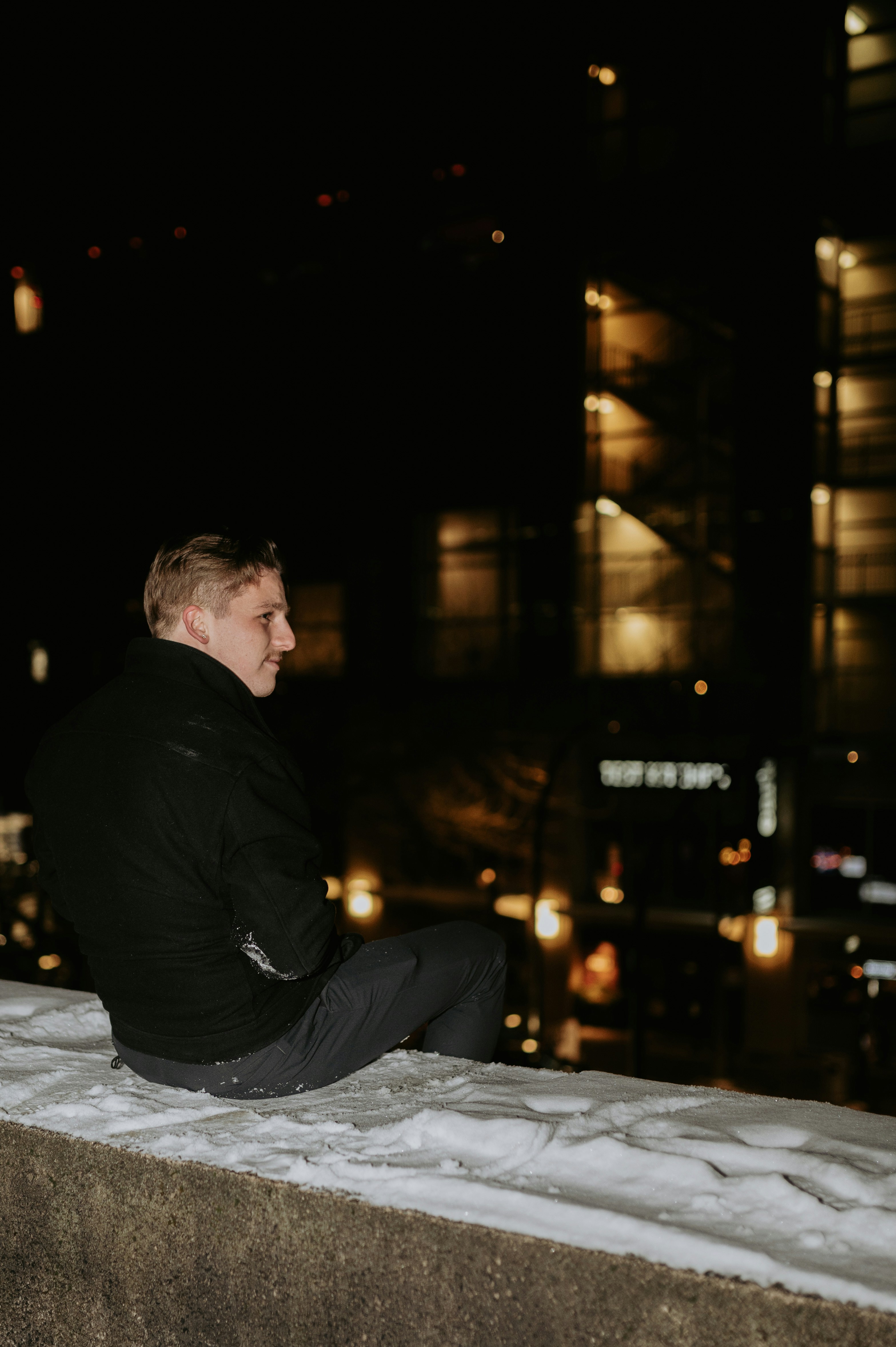 Night Shift on Snow: A Quiet Portrait by the City Lights