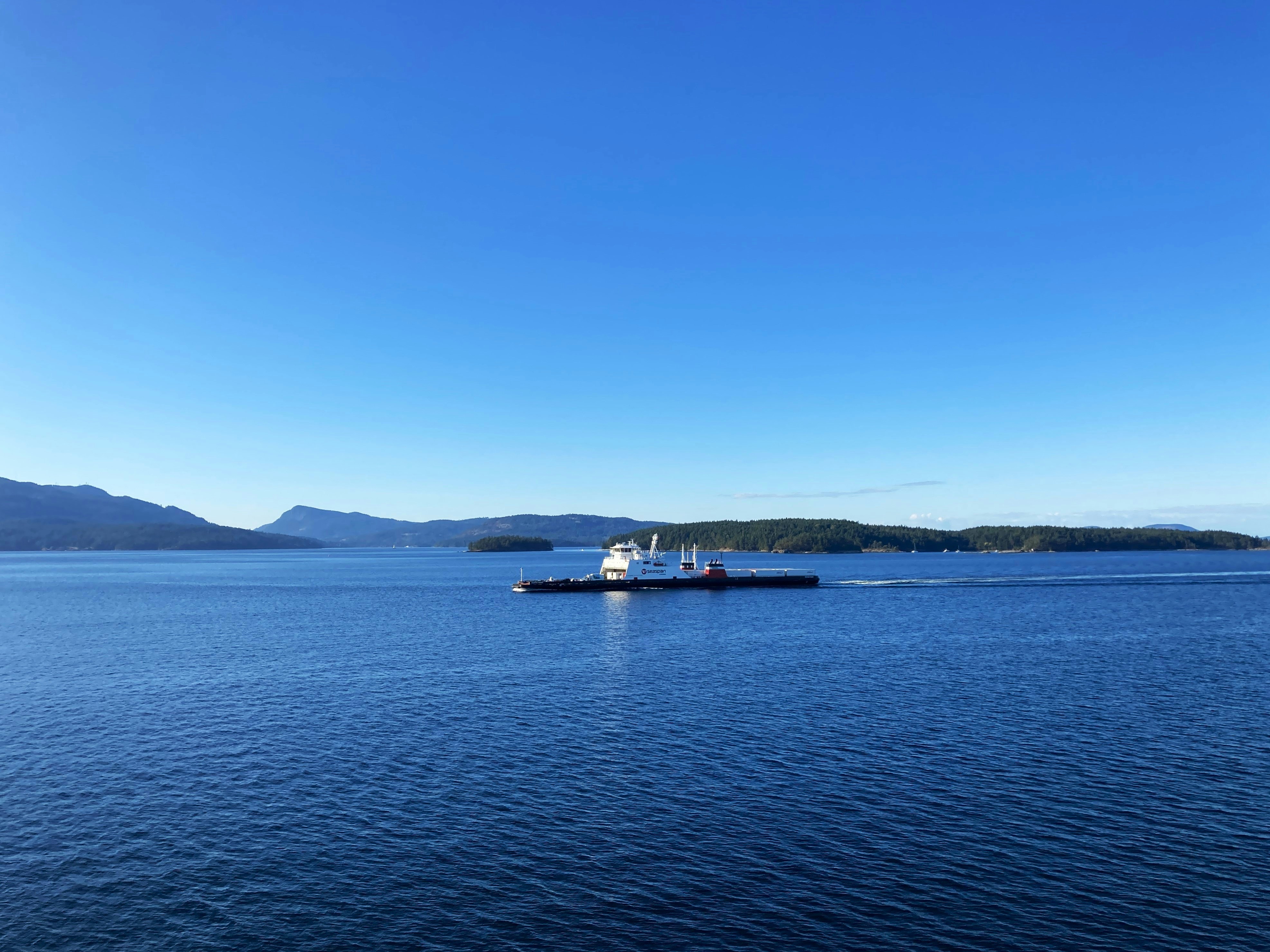 Pacific Ocean - British Columbia, Canada | a large boat traveling across a large body of water