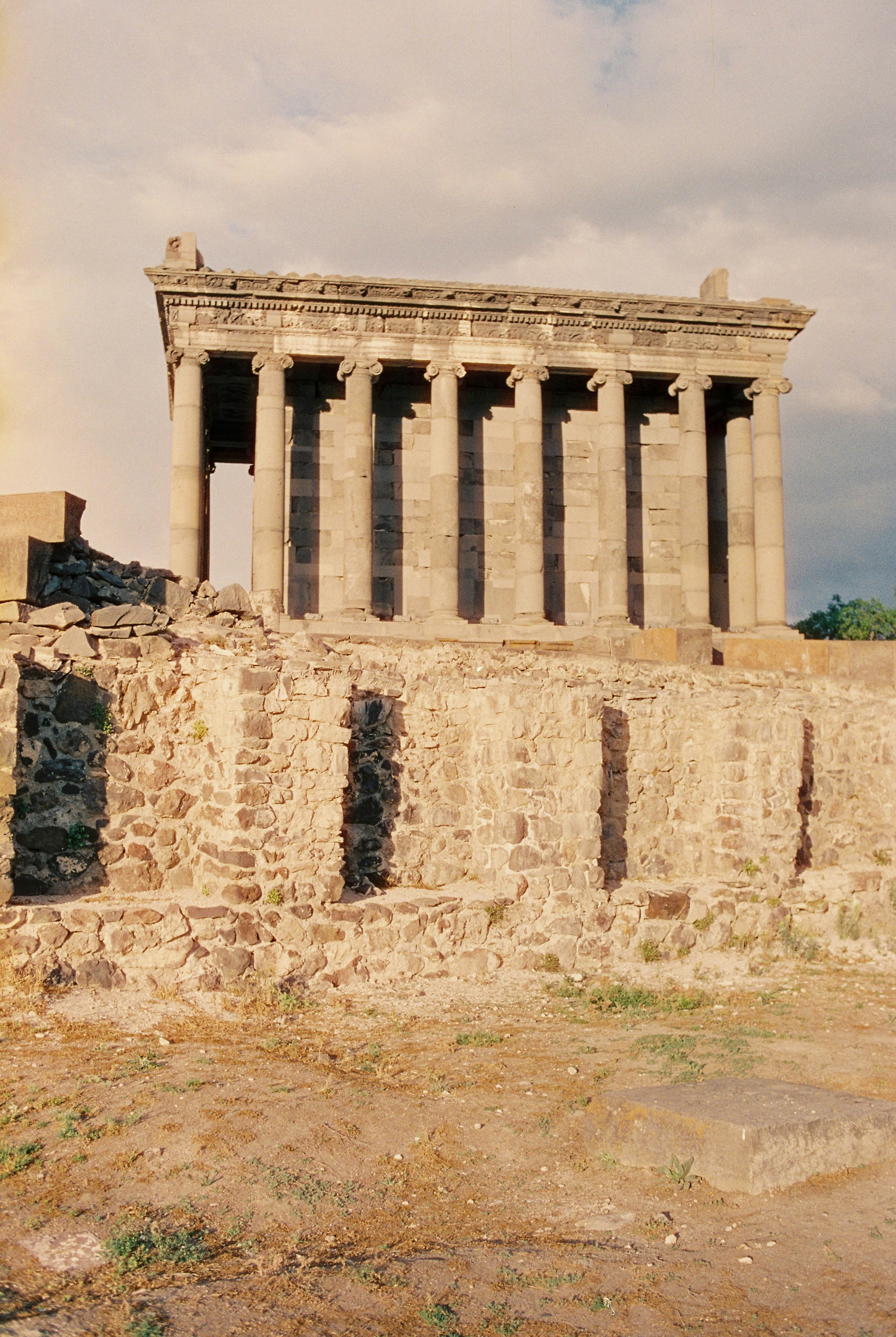 A large stone building with columns on top of it photo – Free Armenia ...