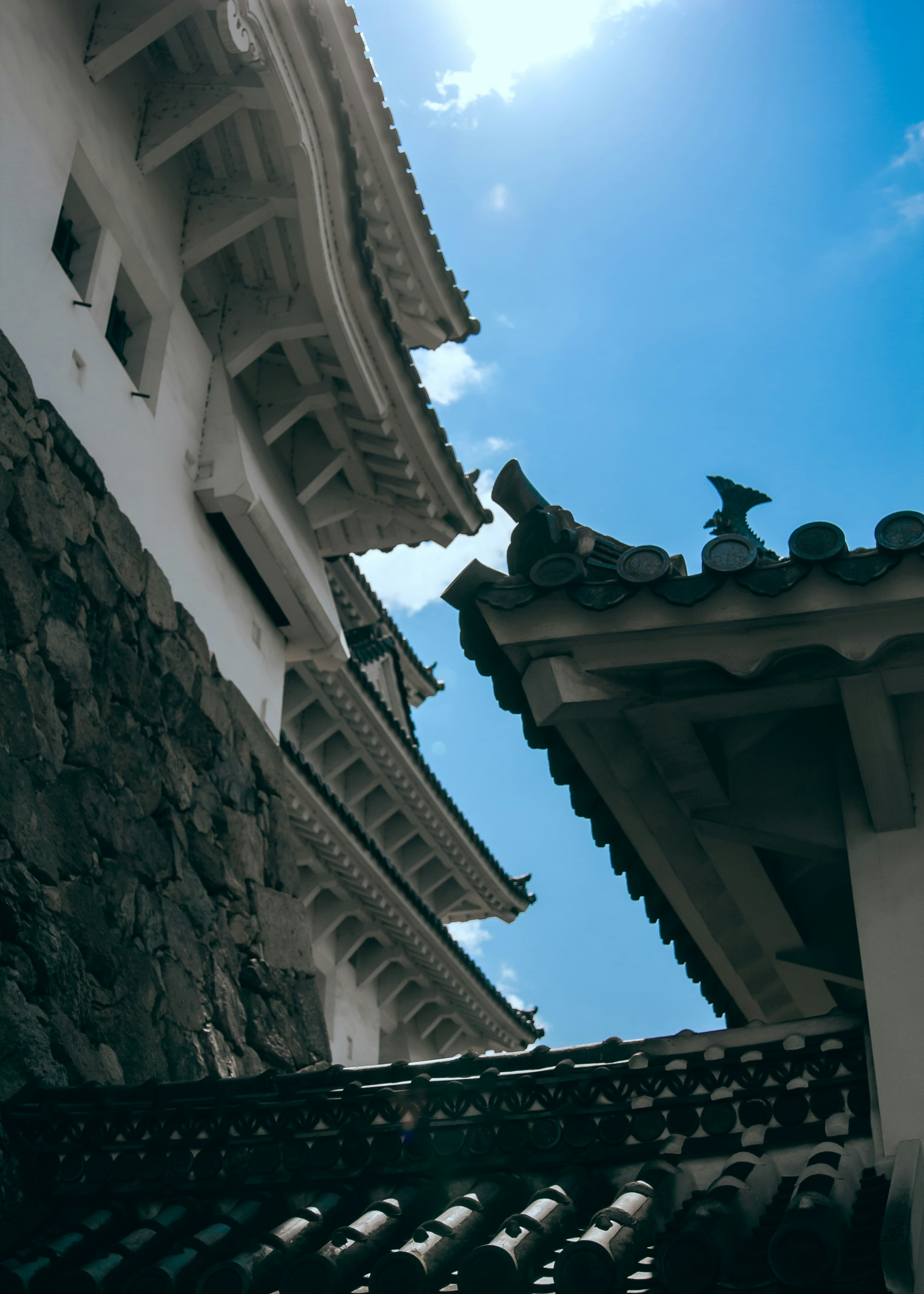 Rooflines and Sky: A Quiet Angle Between Traditional Tiles