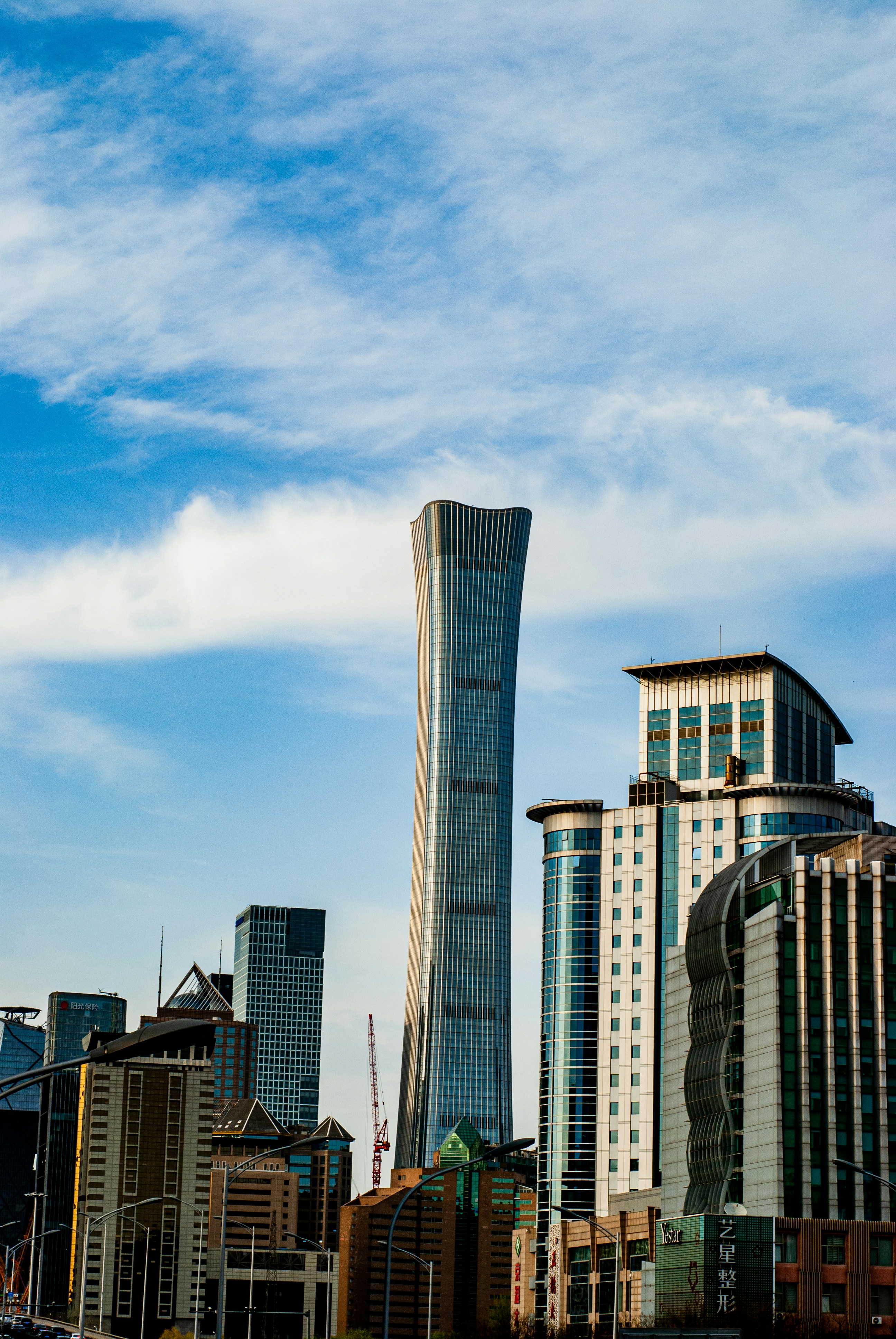 A city skyline with tall buildings and a blue sky photo – Free ...