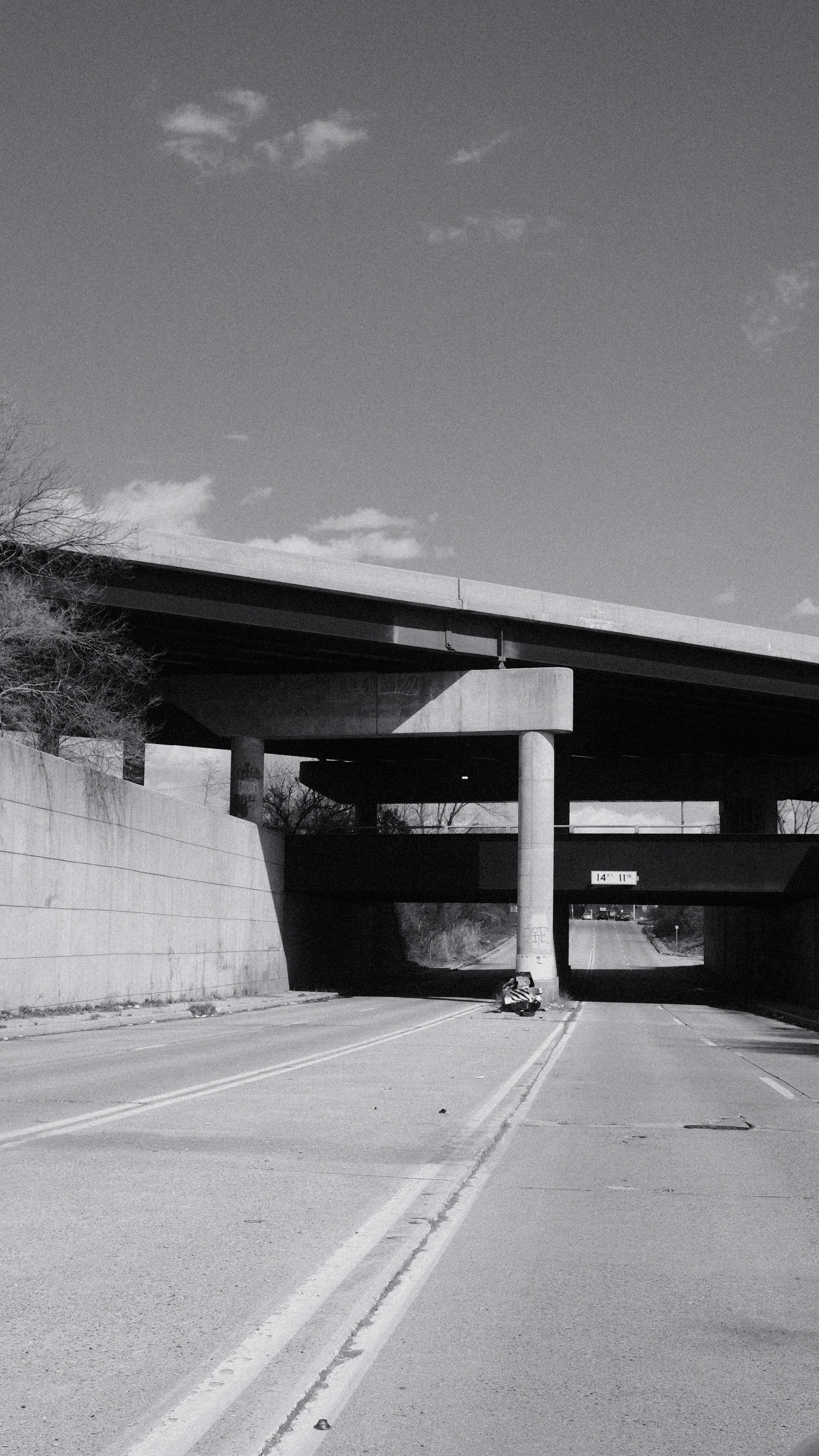 Shadowed Underpass: A Quiet Drive Toward the Light