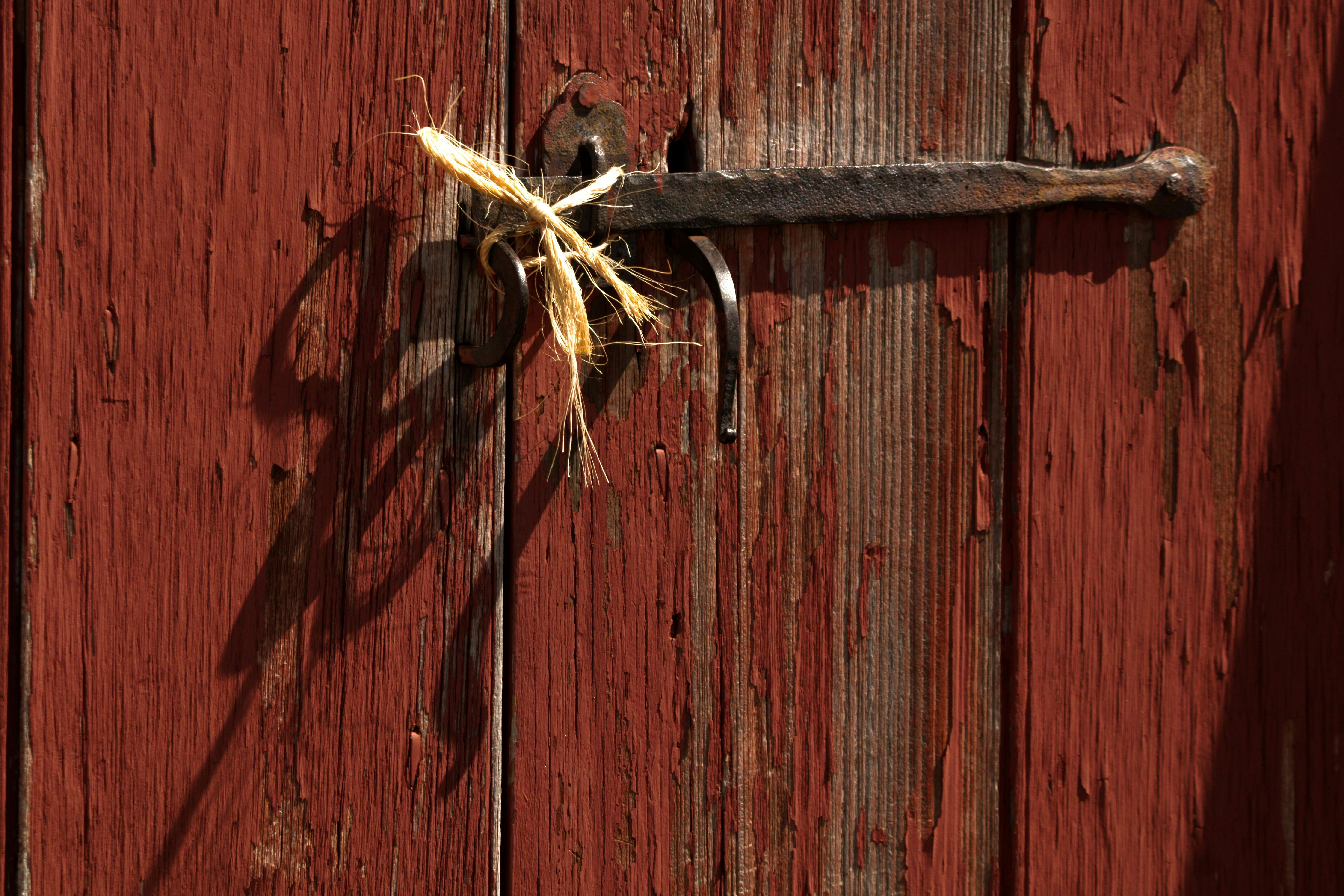 Rustic Charm: The Weathered Red Door
