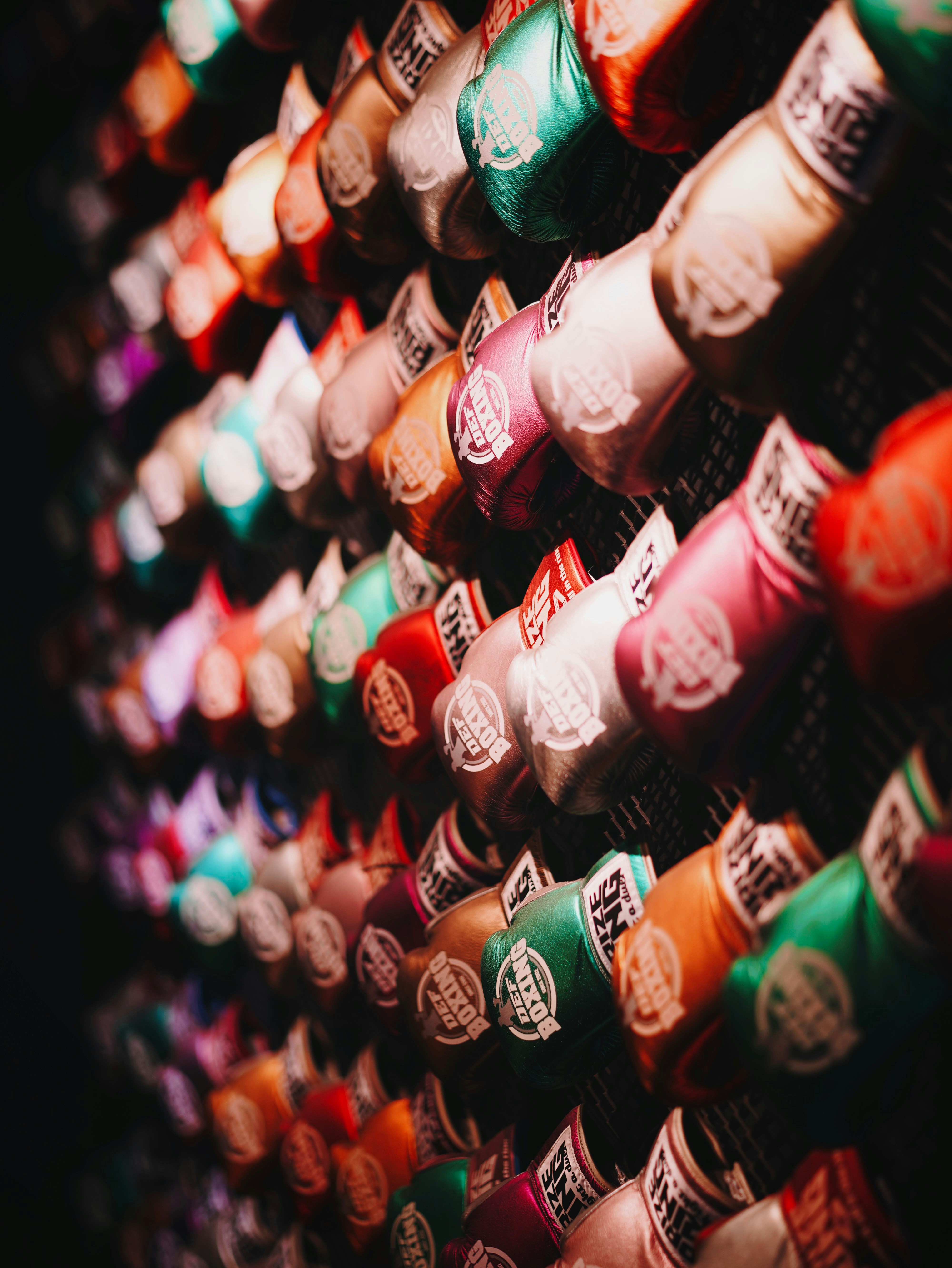 Spectrum Cascade: A Diagonal Wall of Lipstick Tubes with Brand Logos