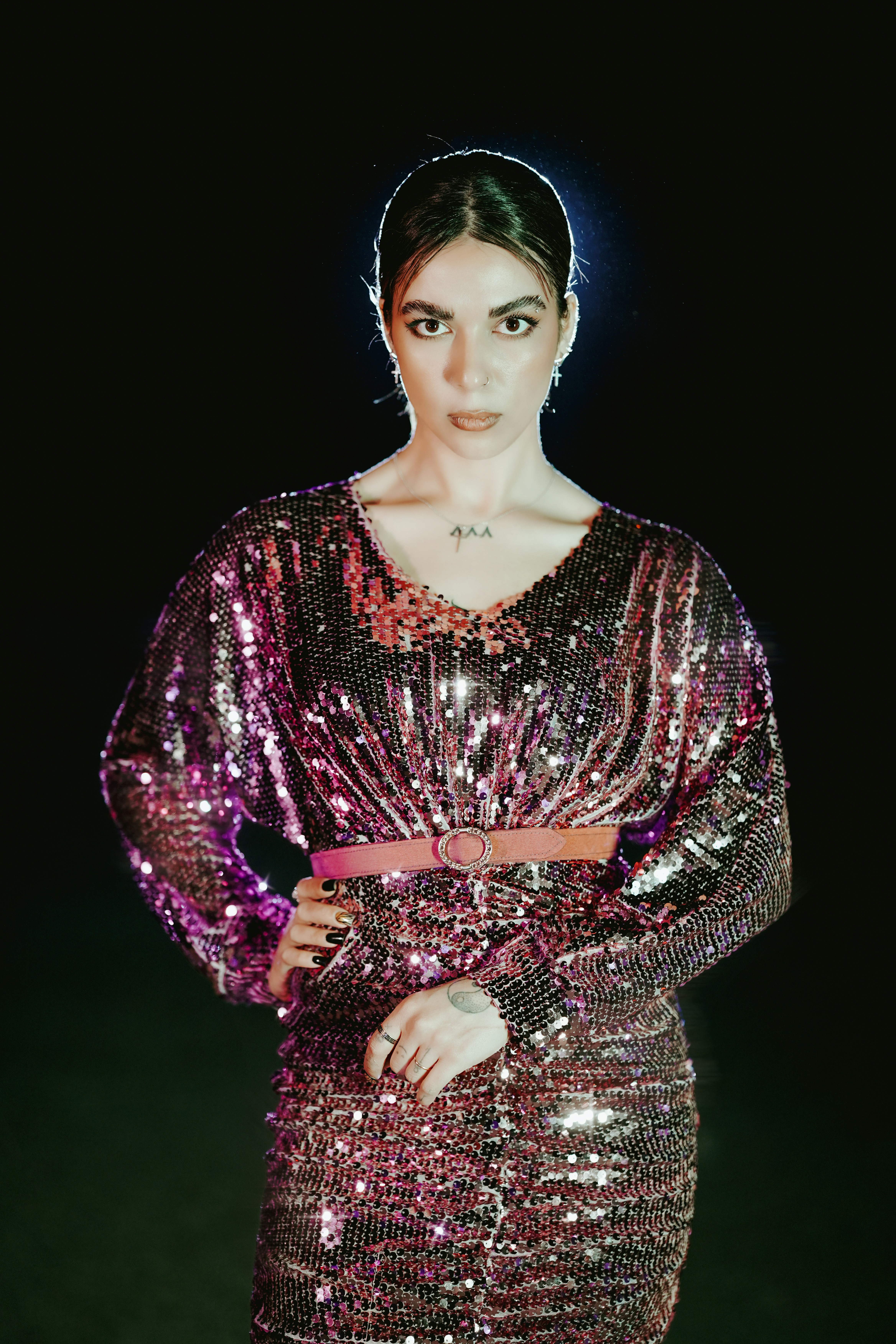 Glam Nightfall: A Sequined Poise Under Spotlight