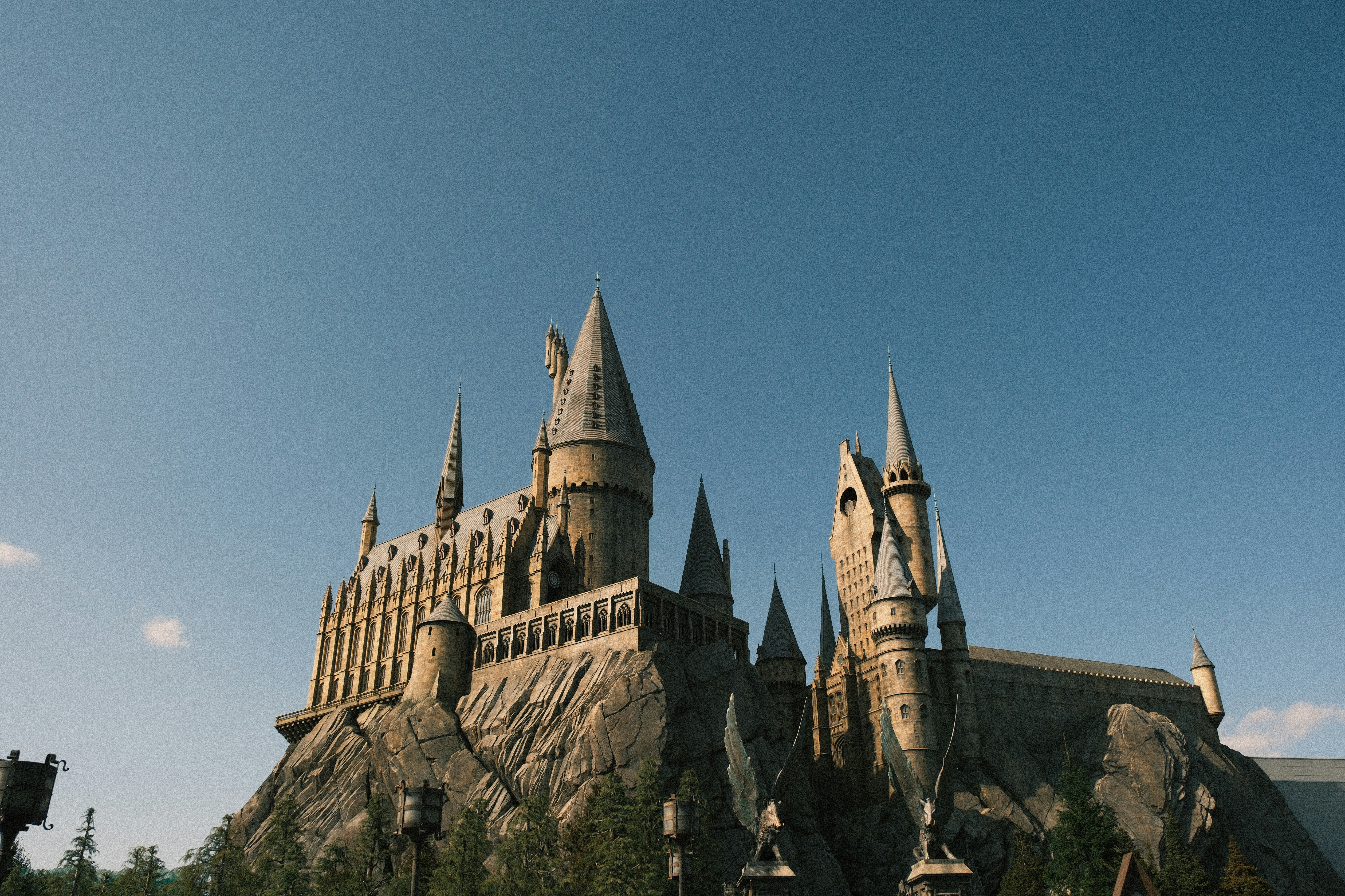 A castle like building with towers and spires photo – Free Universal ...