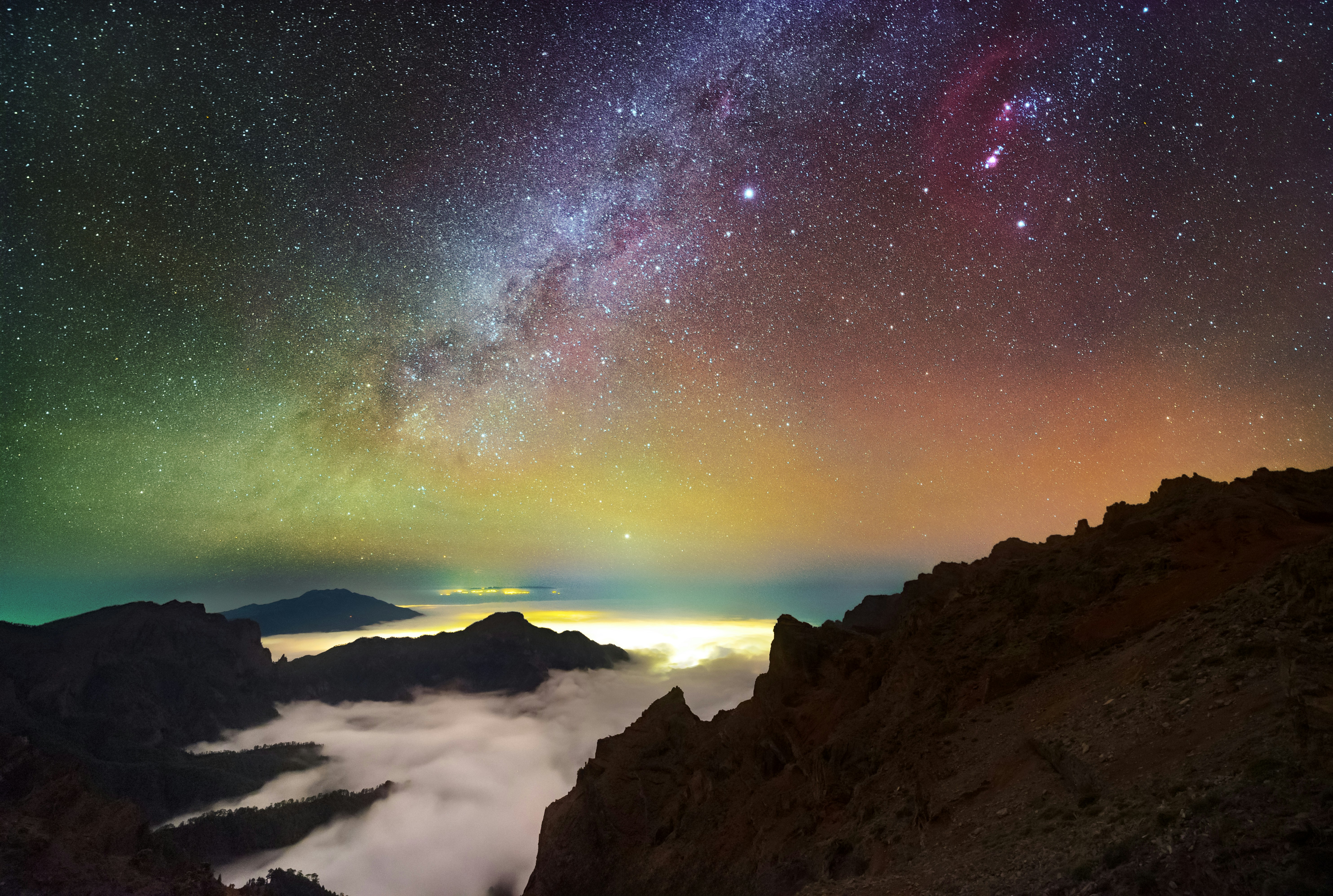 Milky Way Ribbon Over a Fog-Kissed Canyon