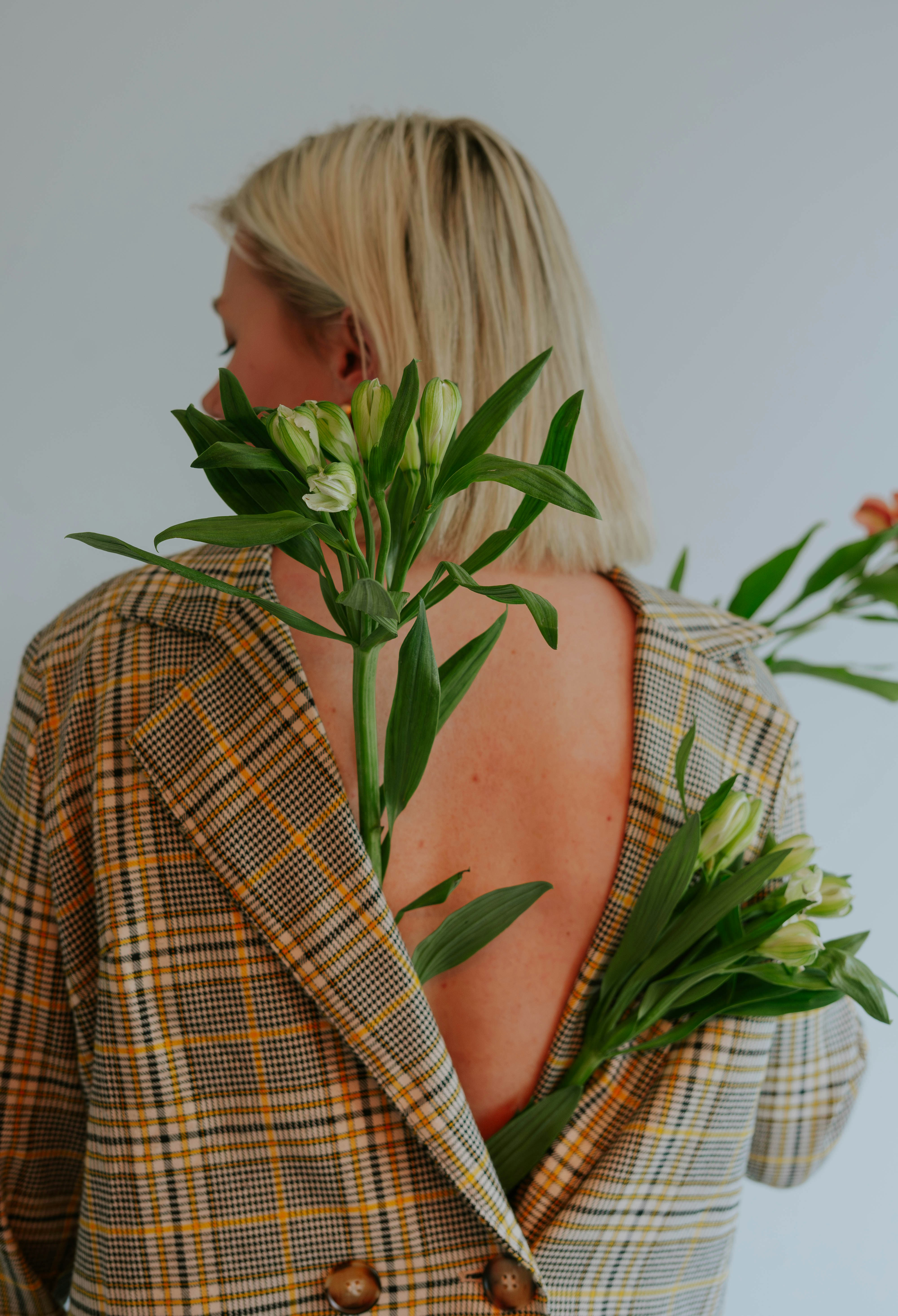 Open-back Blazer with White Lilies: A Portrait of Floral Accents