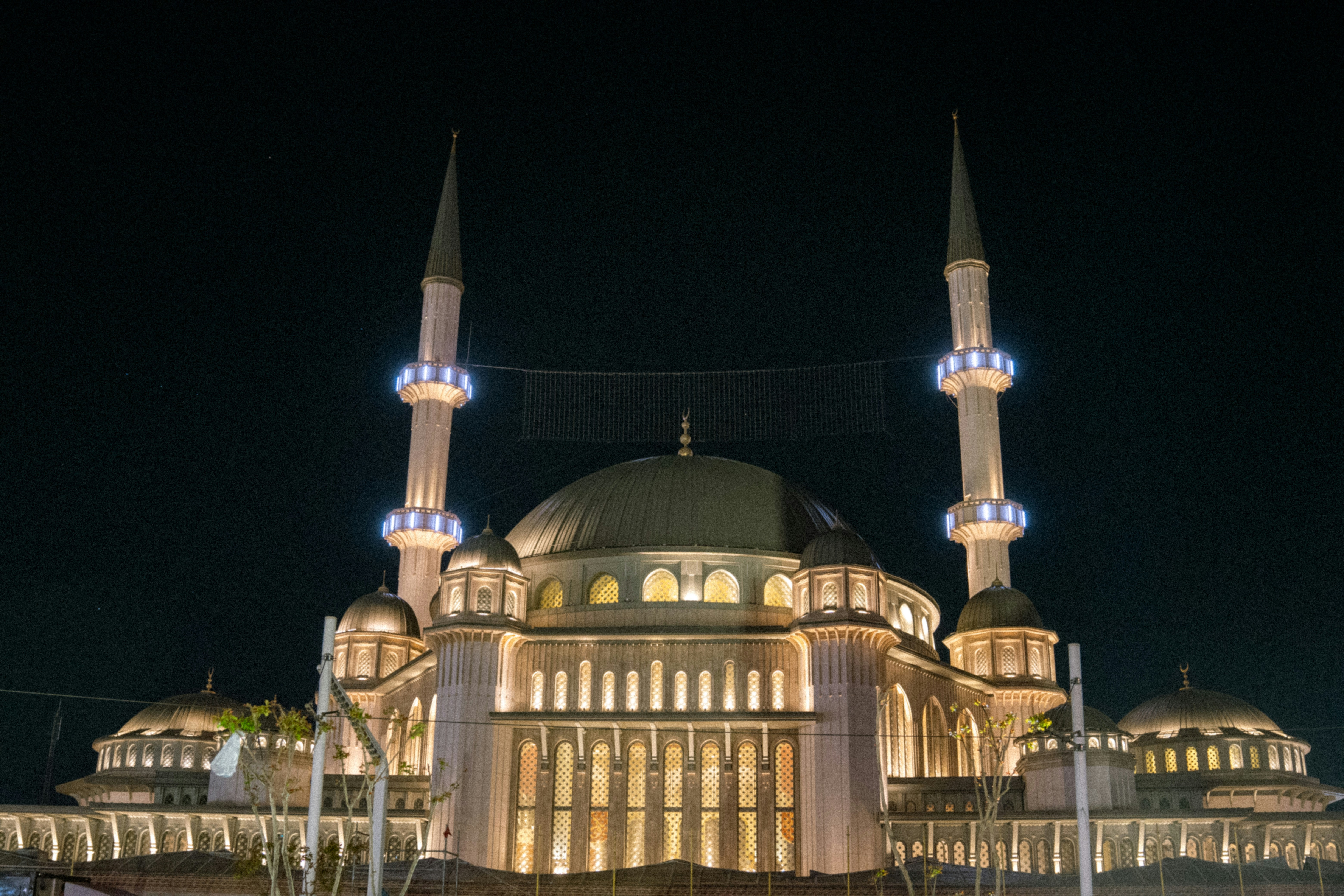 Nocturnal Symmetry: Central Dome Framed by Twin Minarets