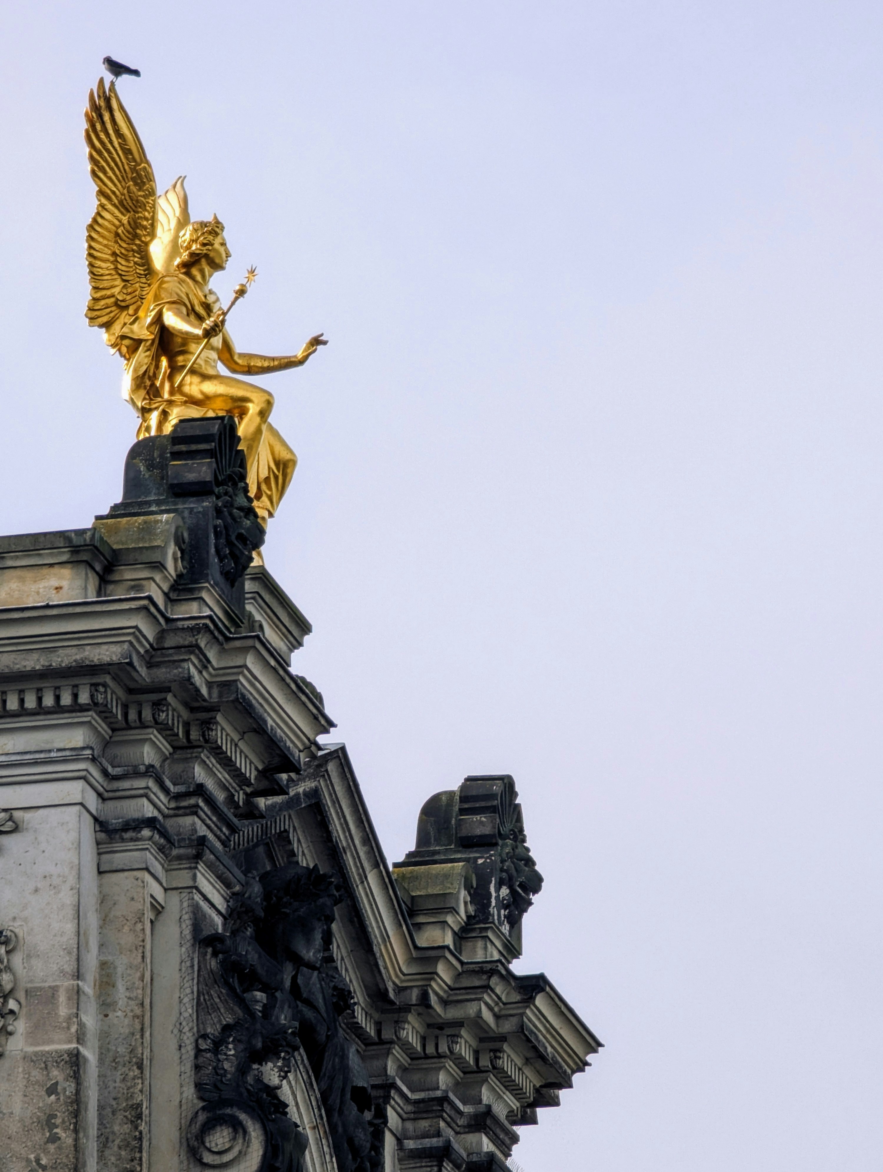 A gold statue on top of a building photo – Free Georg-treu-platz Image ...