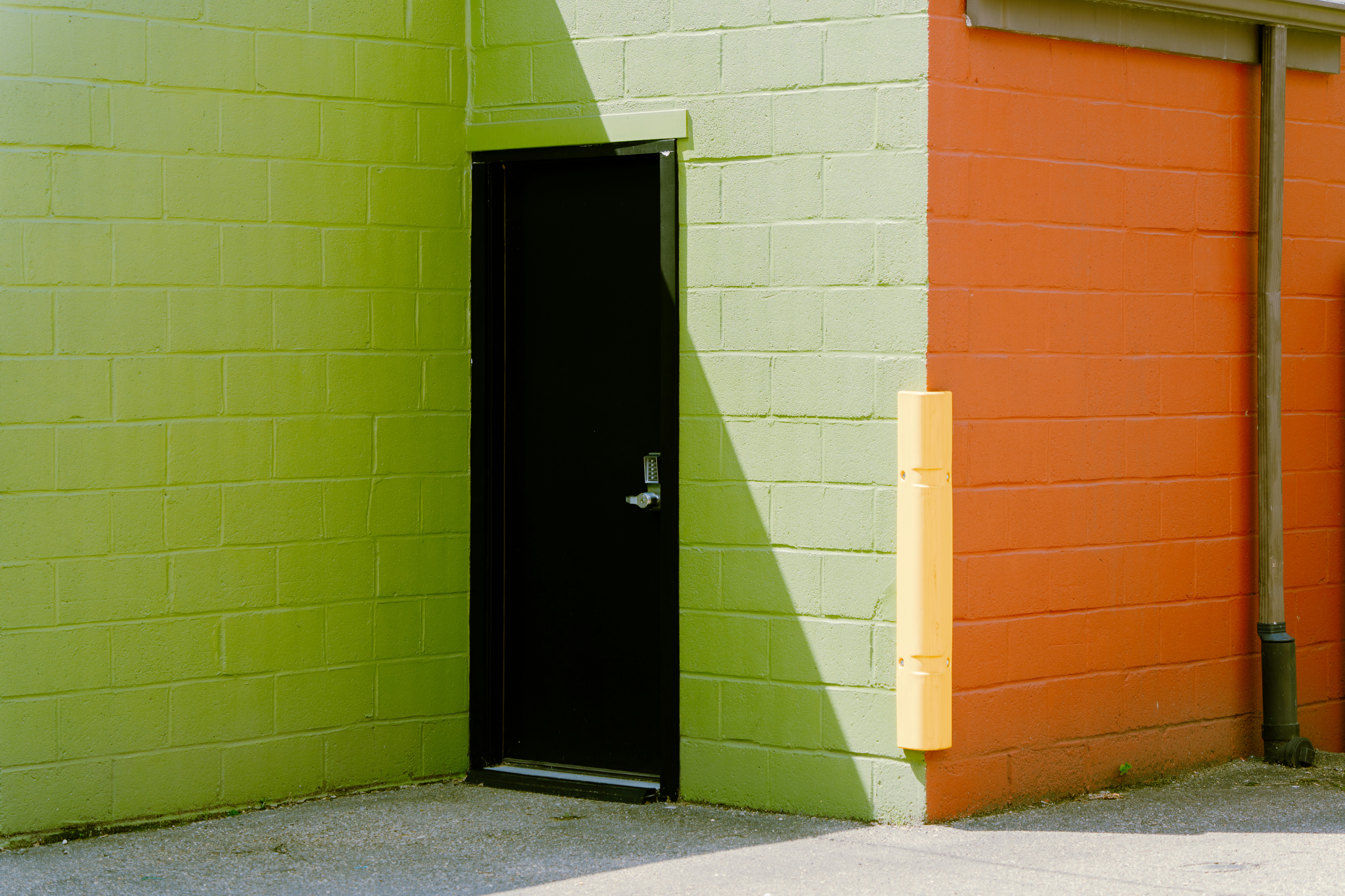 Doorway Between Lime and Tangerine: A Prism Wall Scene