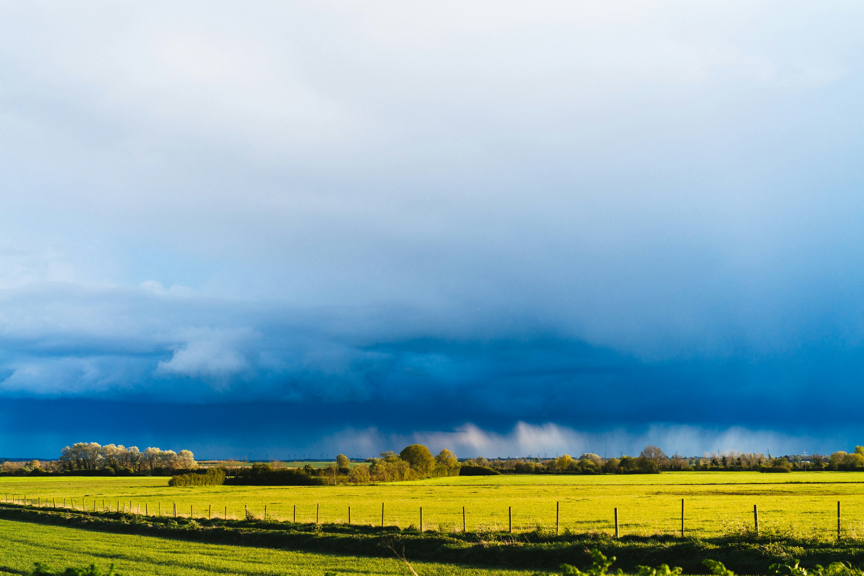 Storm Front Over a Golden Prairie