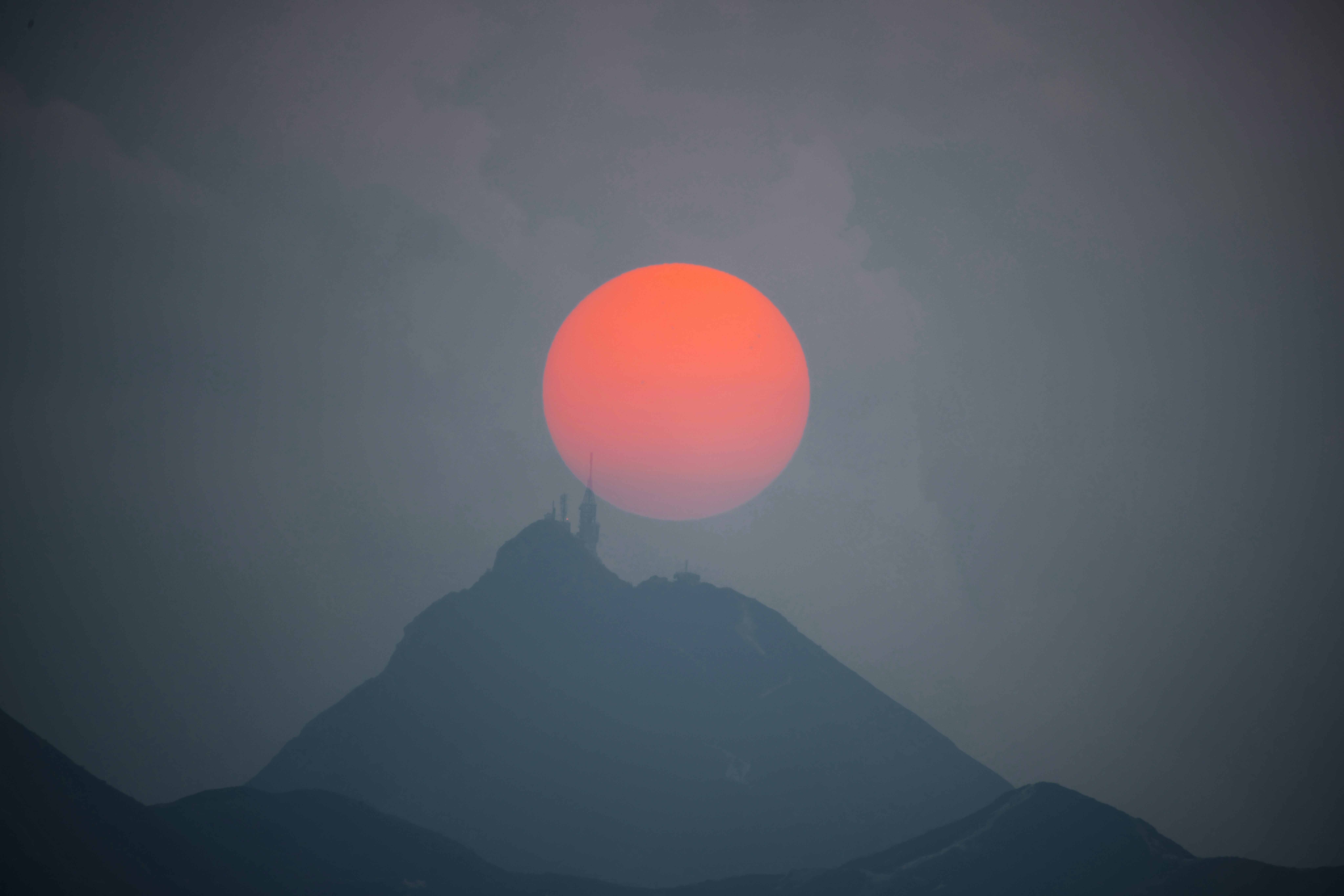 Coral Suncrest Over the Silent Peak