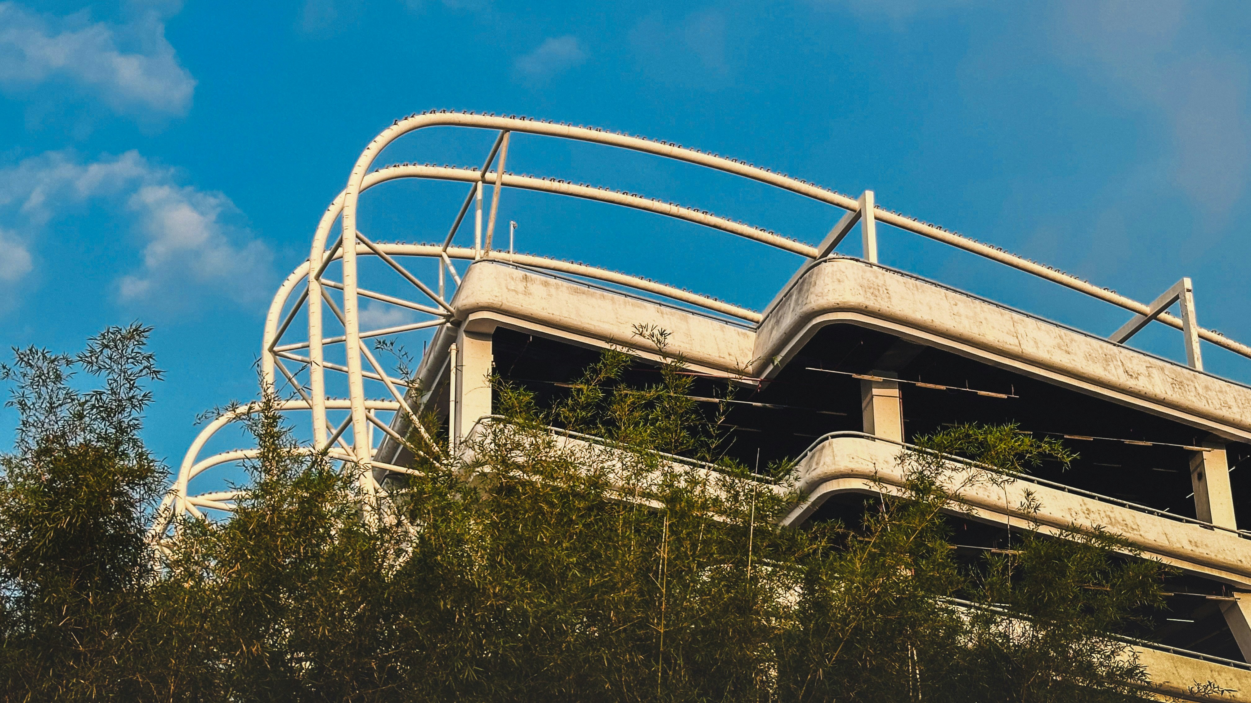 Skyward Curves: A Weathered Parking Structure Reaches for Light