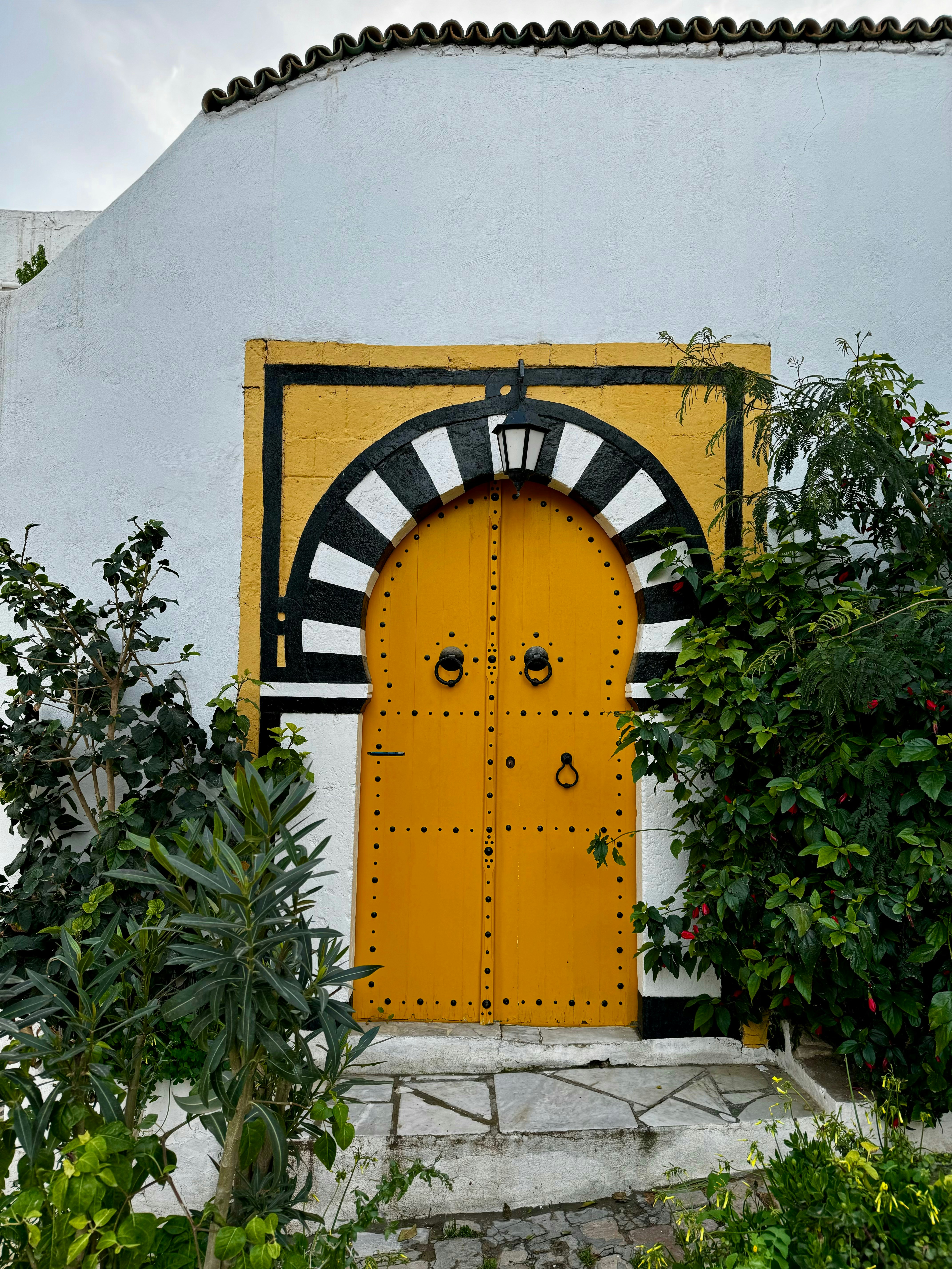 Golden Portal Under a Striped Archway: A Doorway of Sunlit Yellow