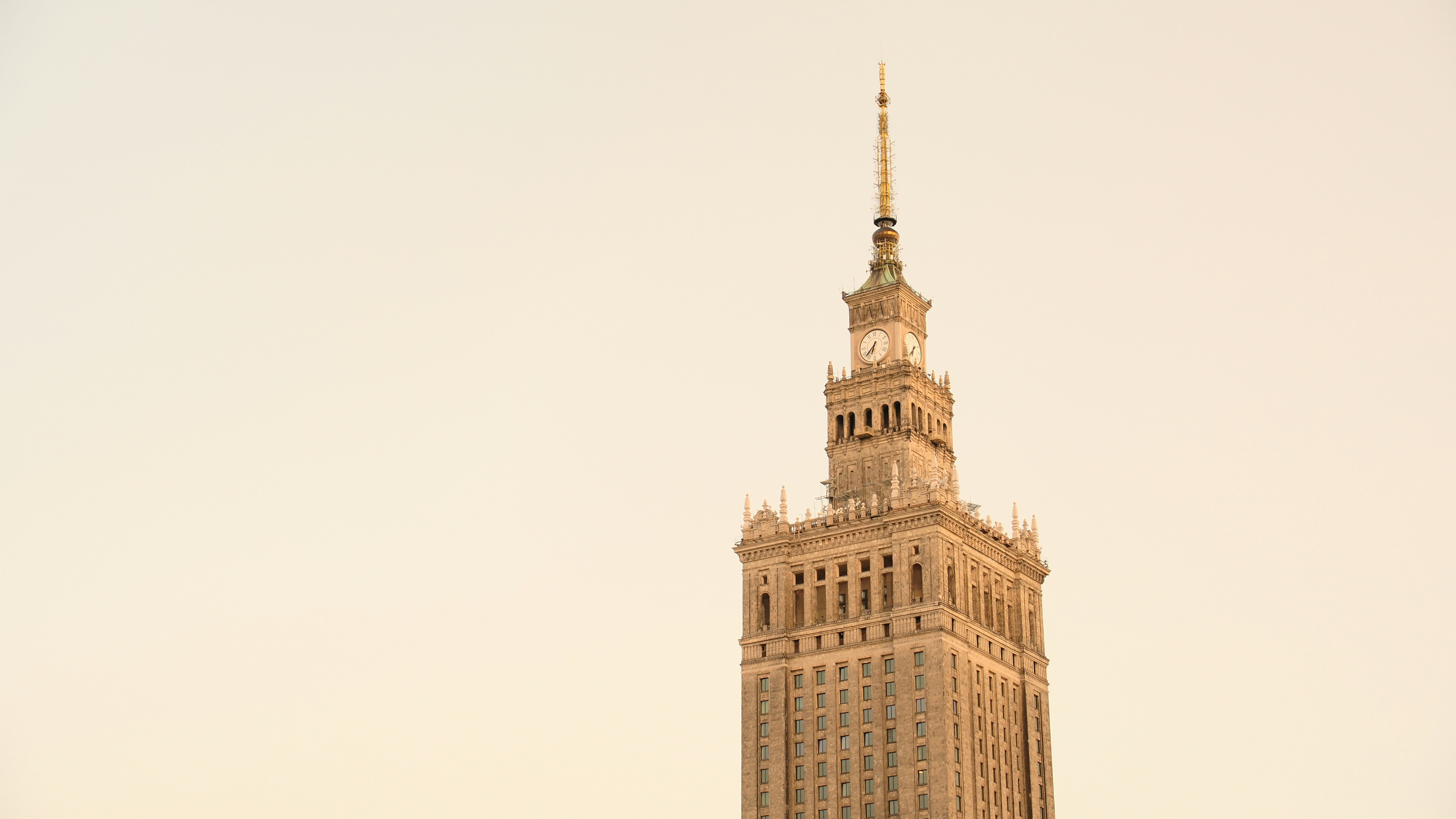 Amber Hour over Warsaw's Clocktower: A Spire in Quiet Light