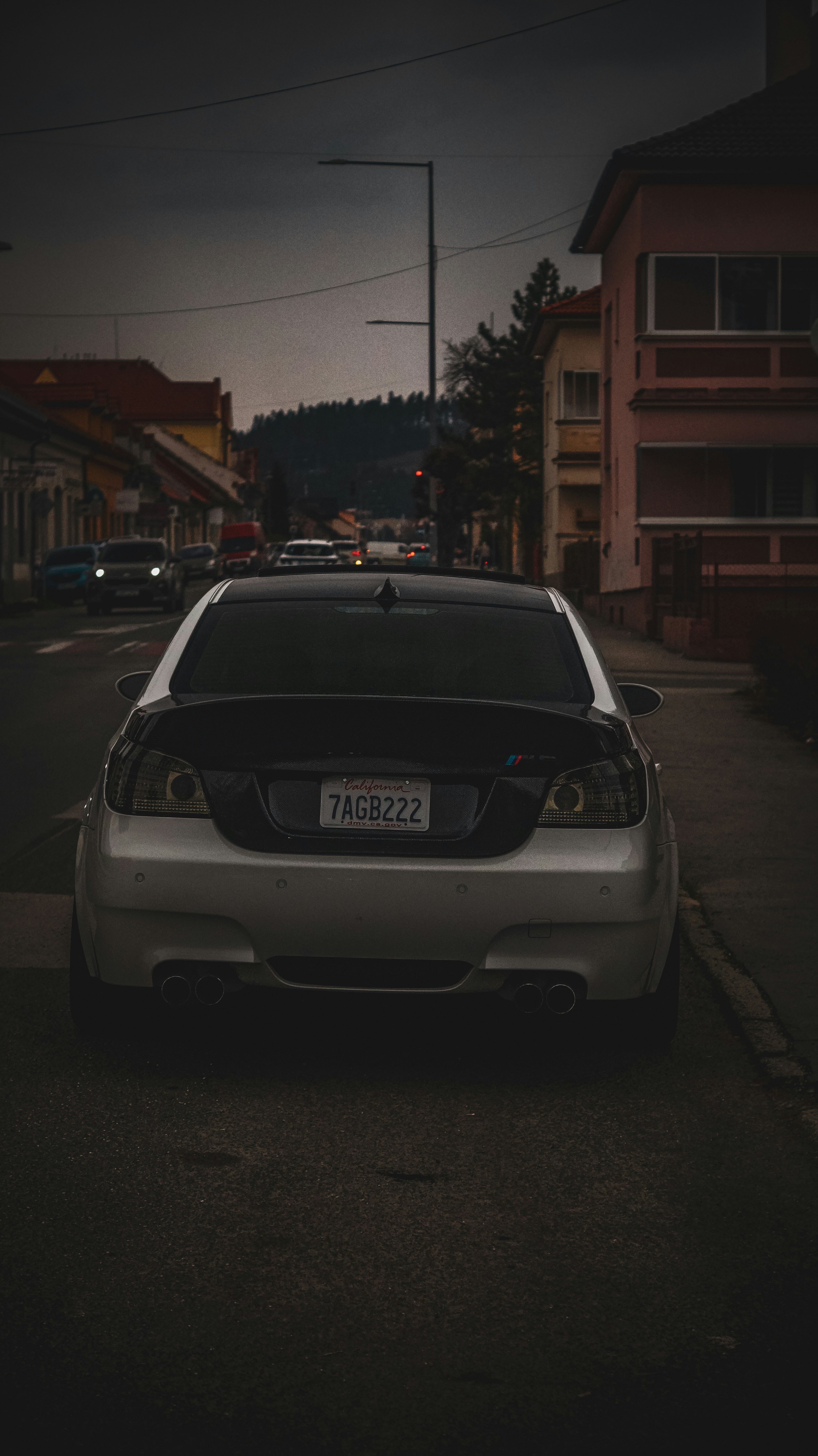 Midnight Main: The White BMW Resting in a Dim Street Corridor
