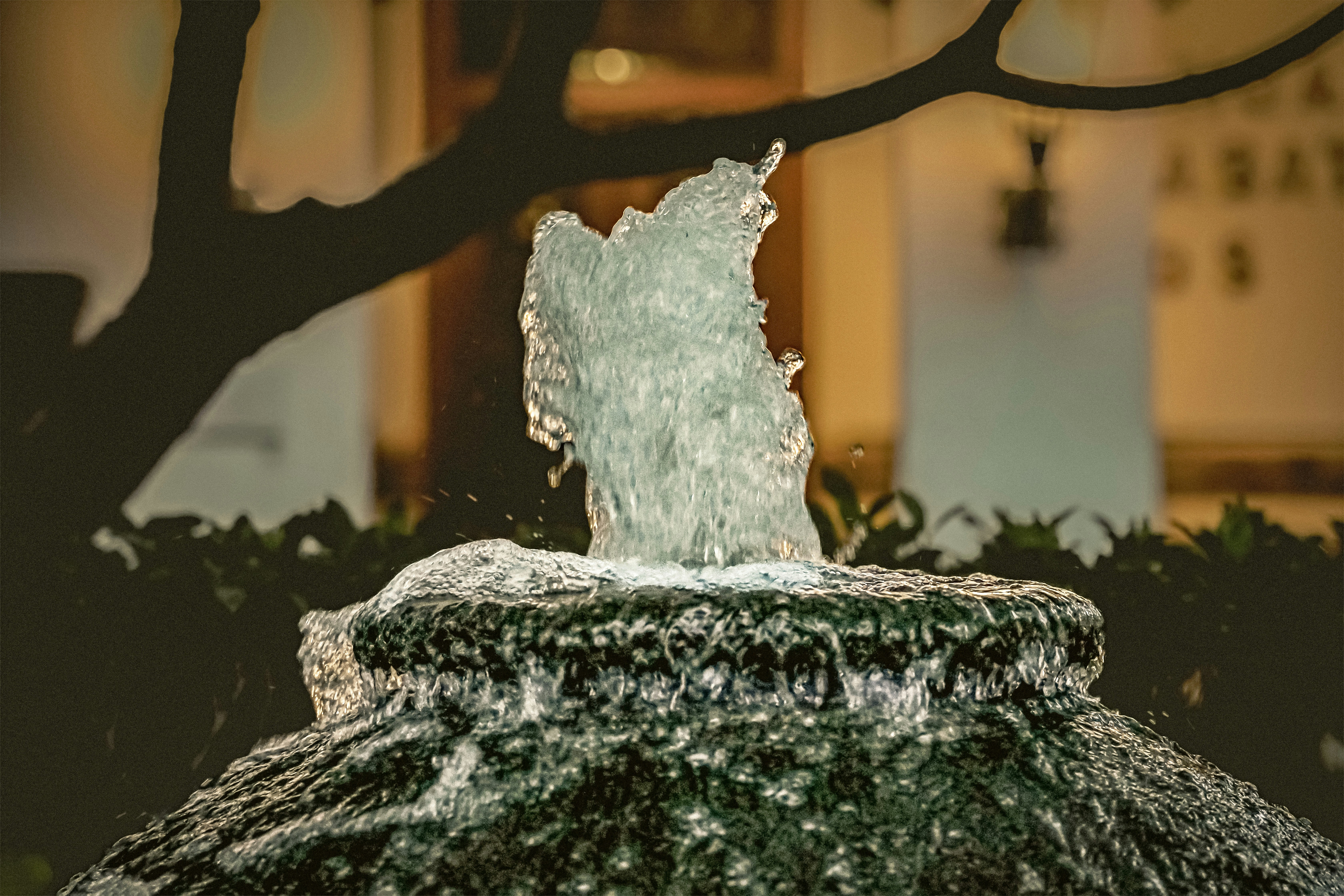 A water fountain spewing out of it's side photo – Free Building Image ...