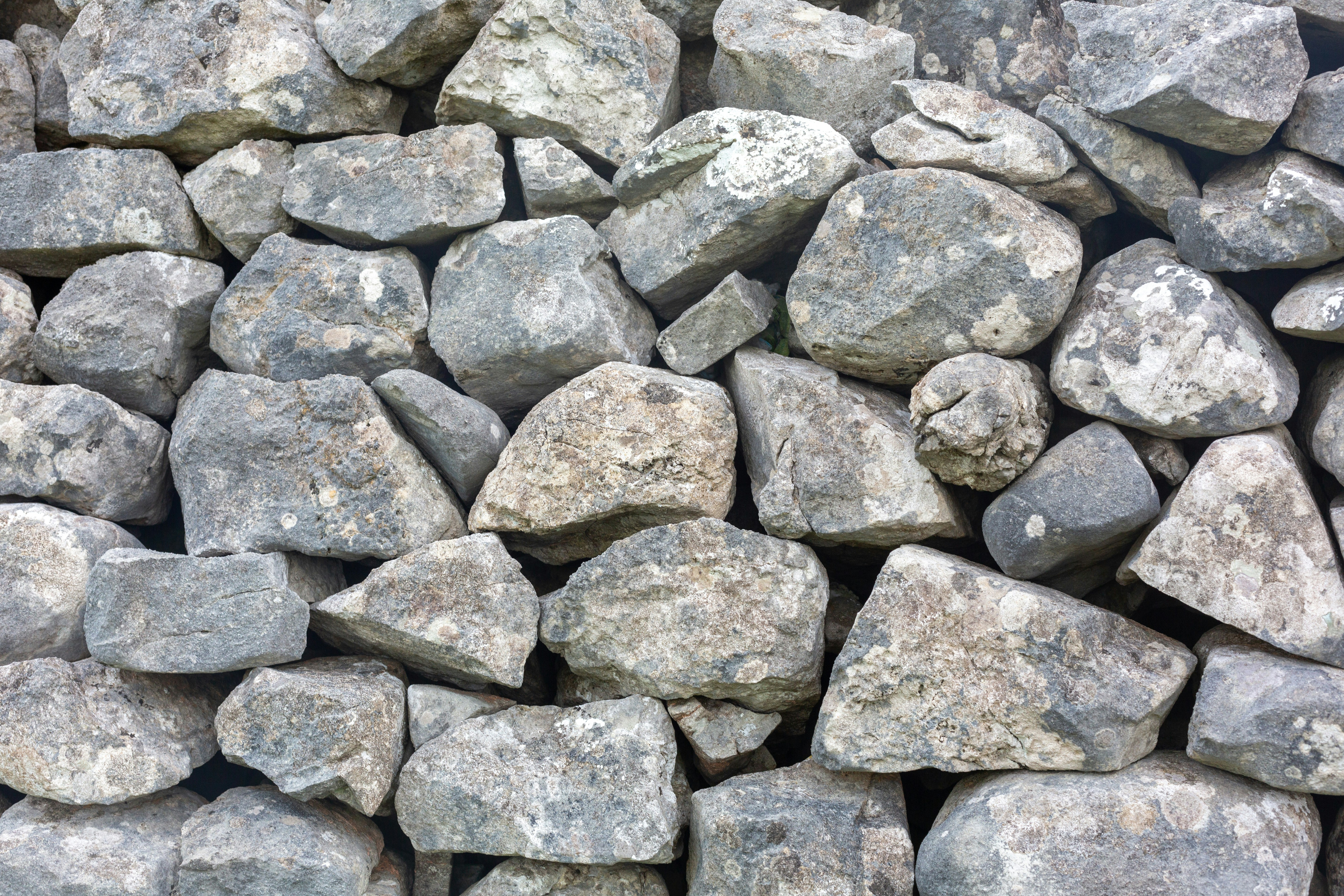 A close up of a dry stone wall.