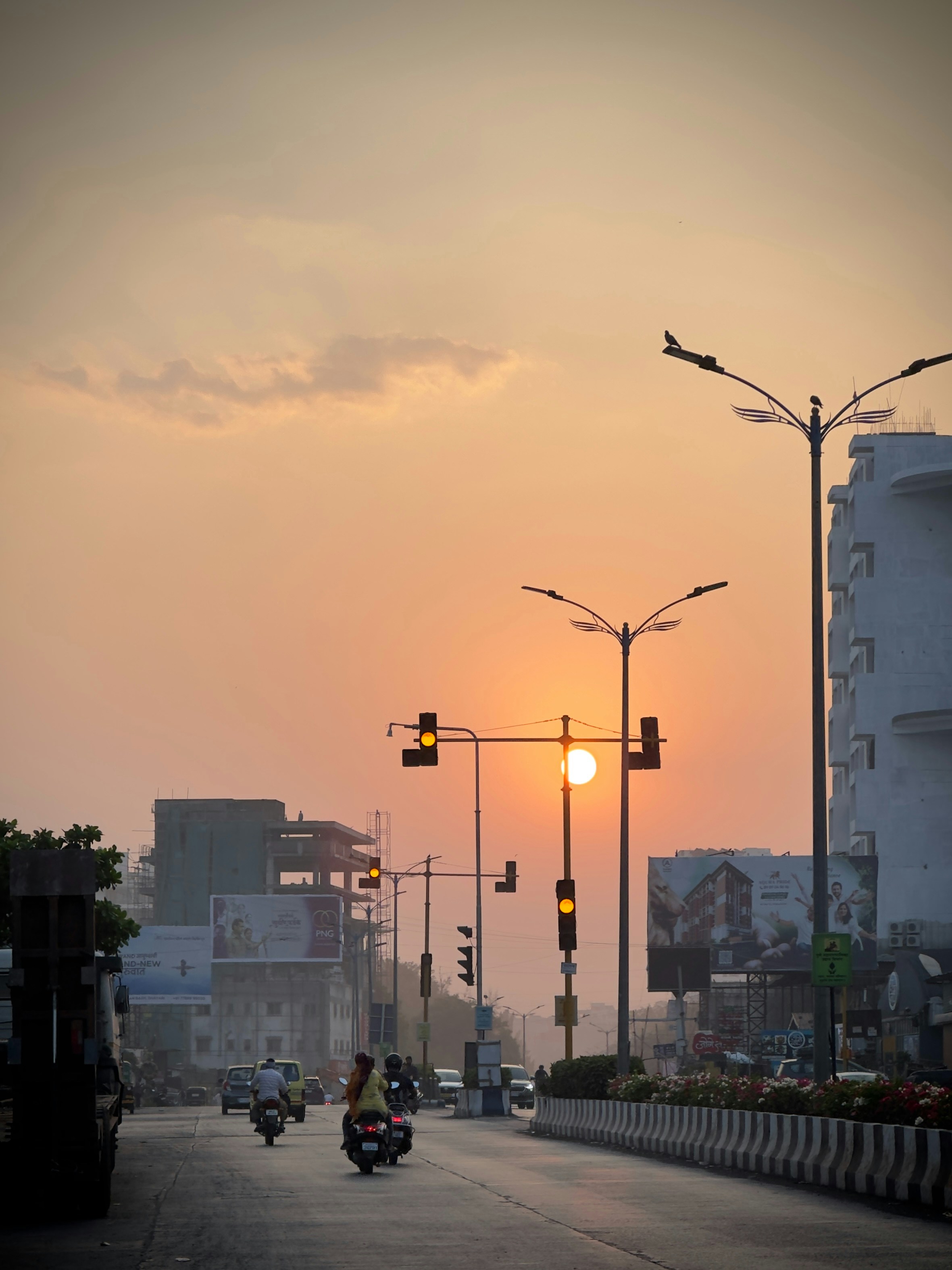 Sunset Wake: Streetlights, Crossroads, and a Warm Horizon