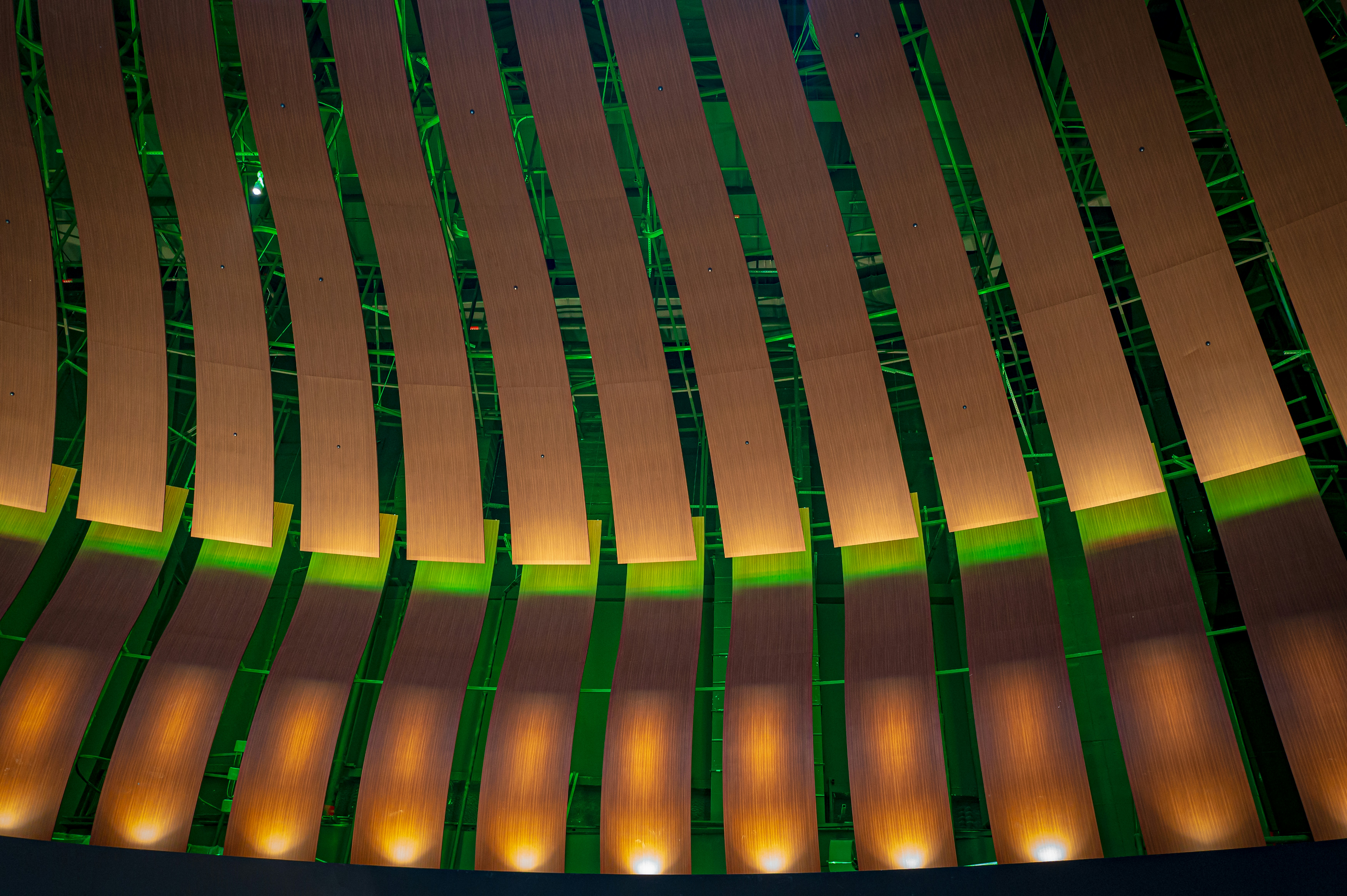 The ceiling of a concert hall with green and yellow lights photo – Free ...