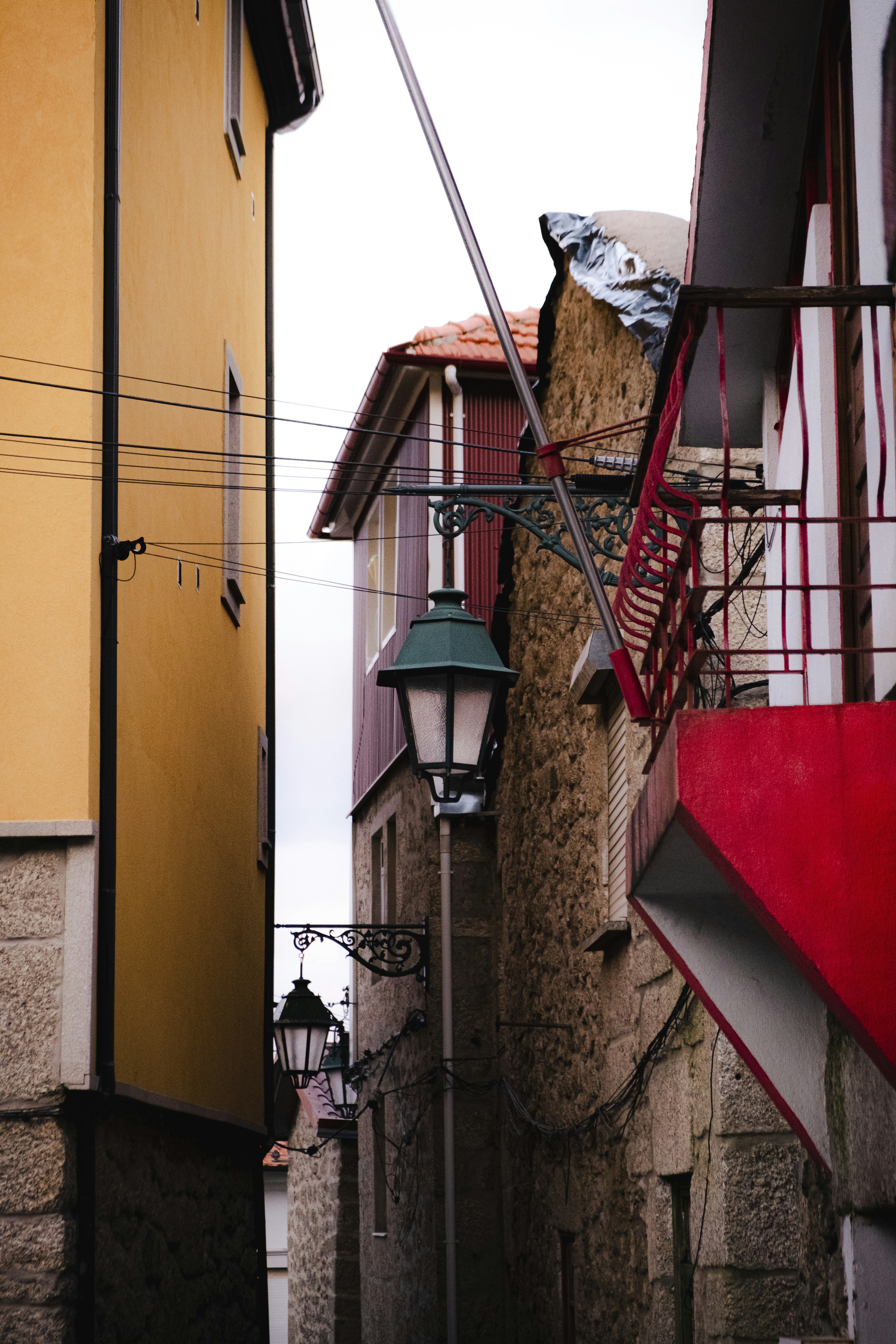 Narrow Street Lanterns: Quiet Urban Passage