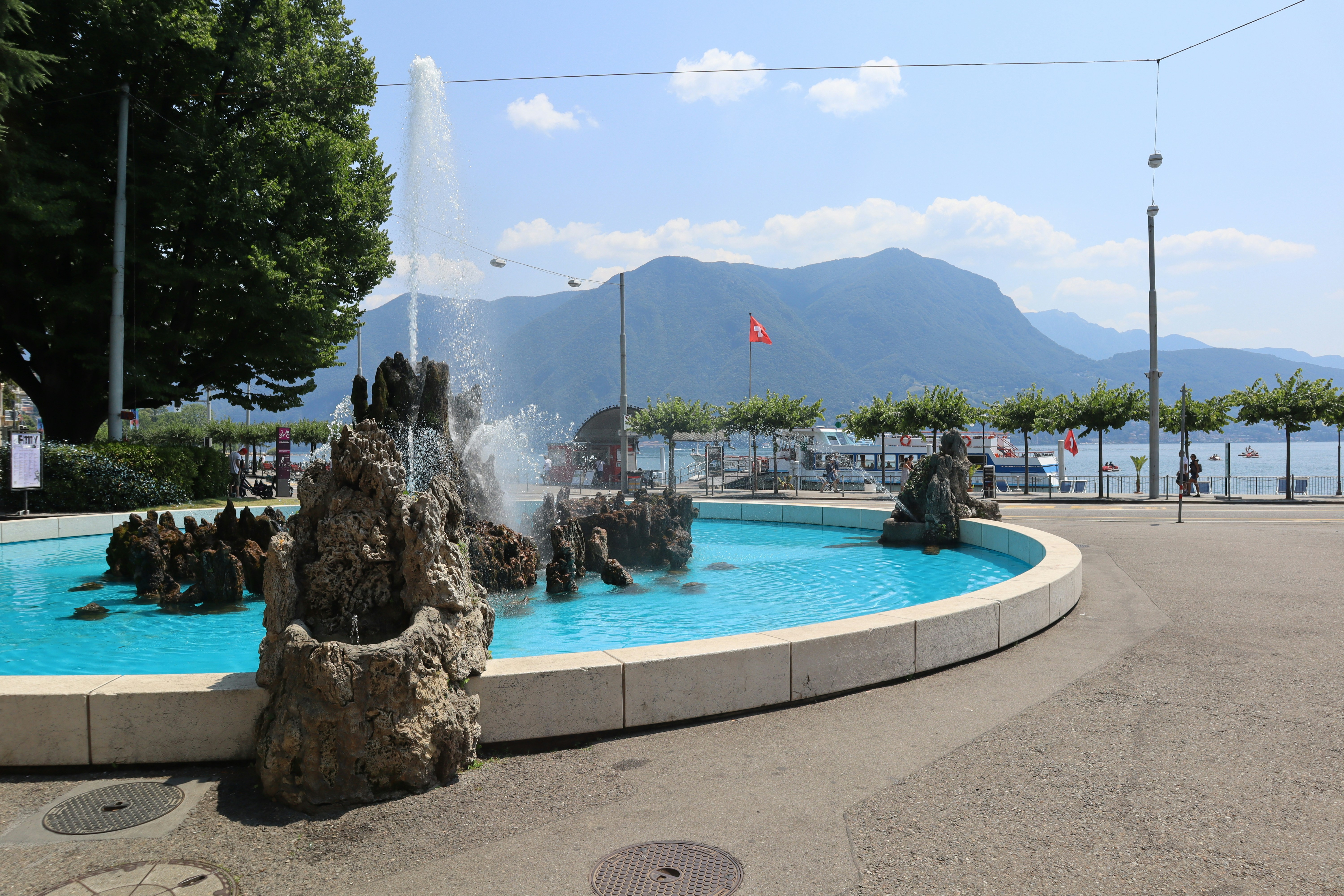 A fountain with water spouting out of it photo – Free Switzerland Image ...