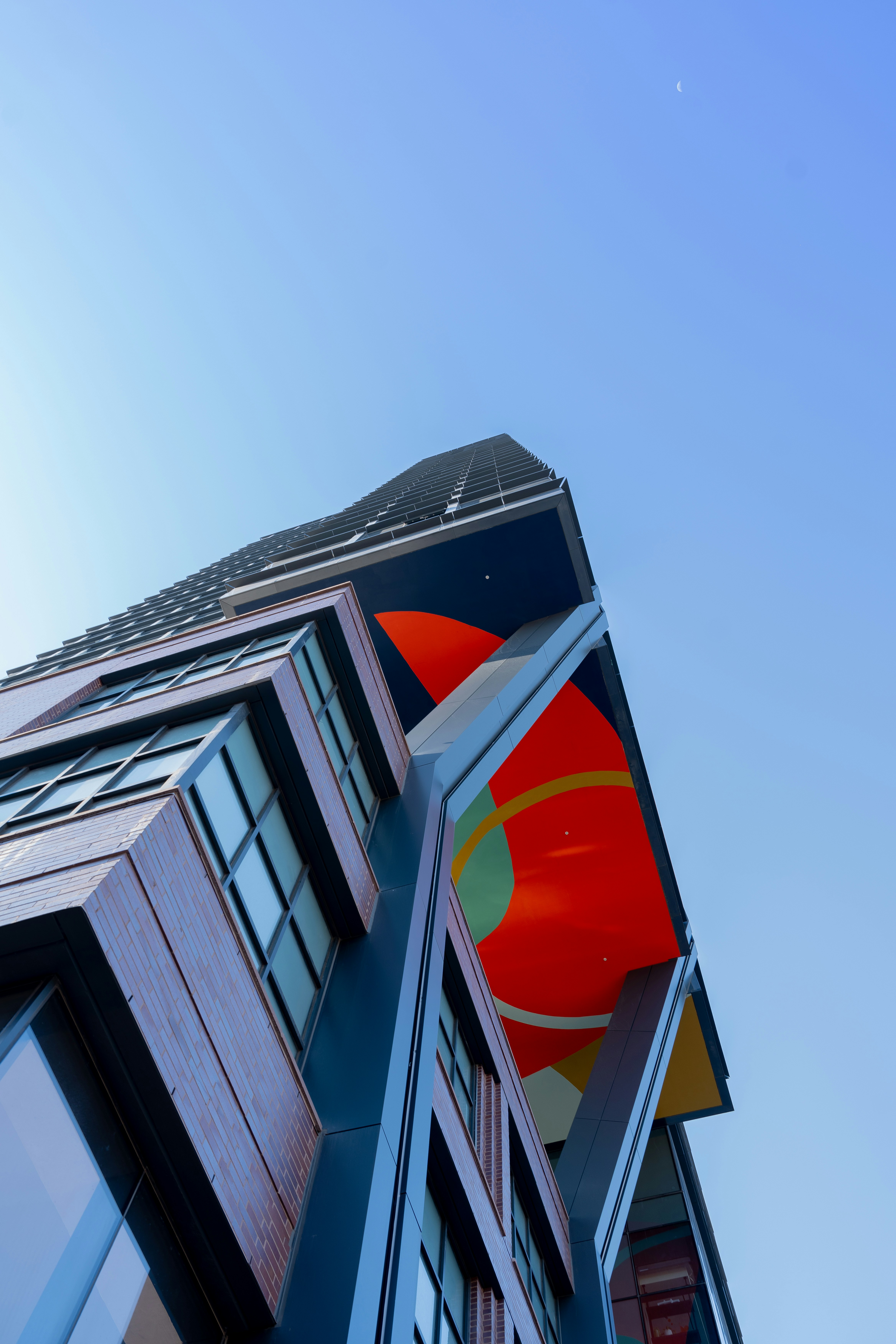 Chromatic Canopy Ascending: A Tilted Tower with Neon Curves