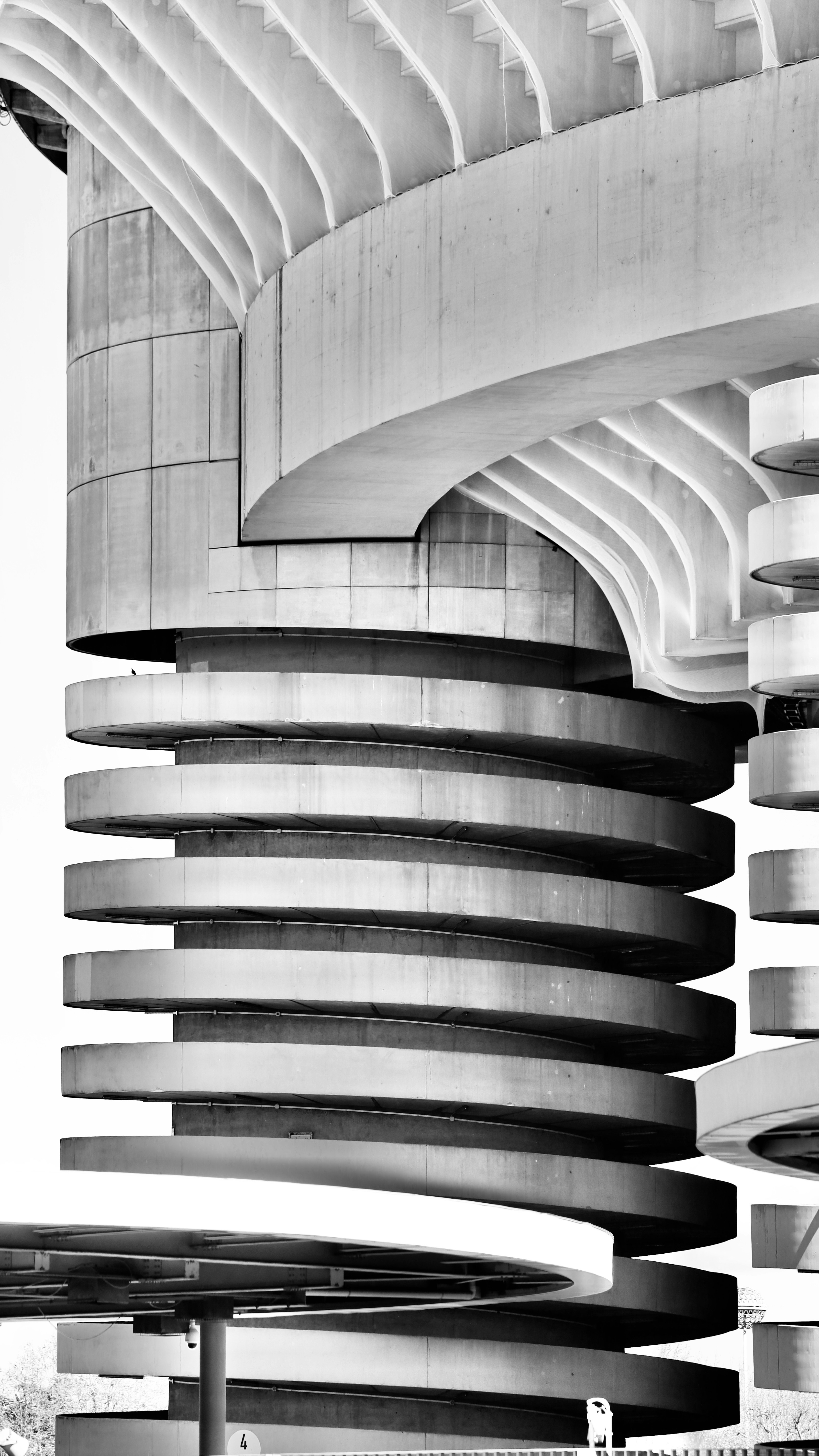 Concrete Helix: Monochrome Close-Up of Spiraling Architecture