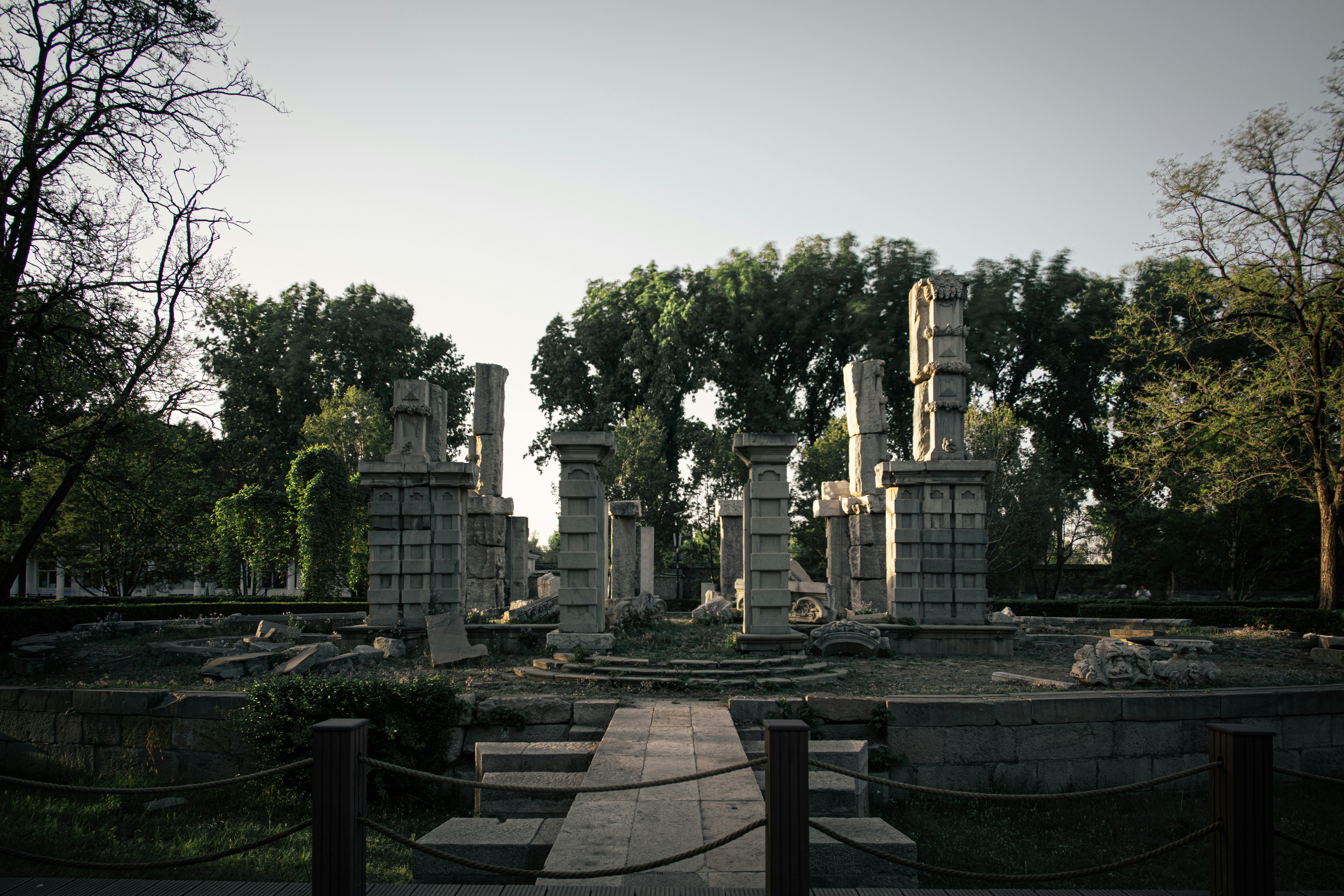 Ruins in a Quiet Park: Central Columns Under Sunset Light