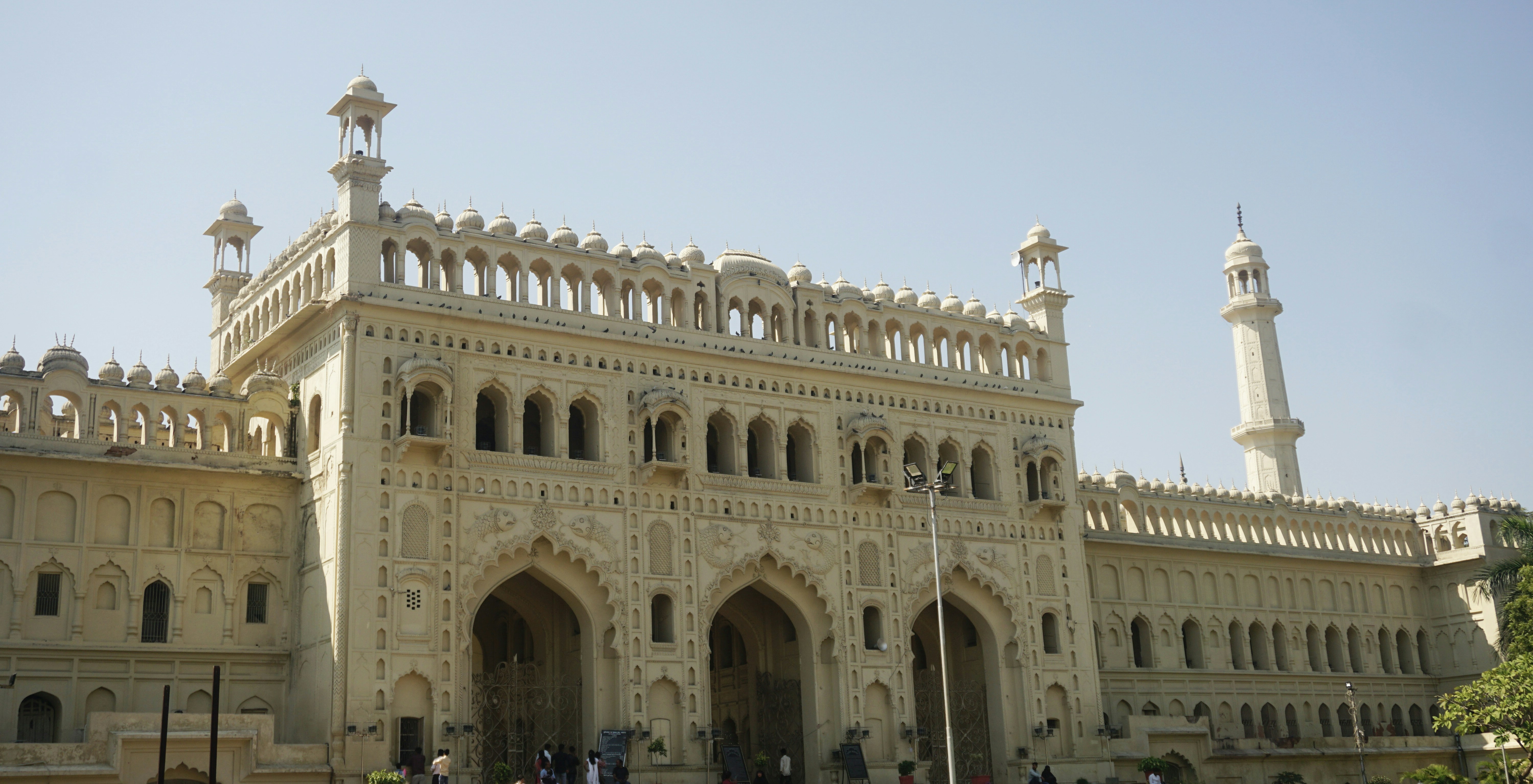 Morning Light on a Lace-ornate Palace Facade with Arches and Minarets