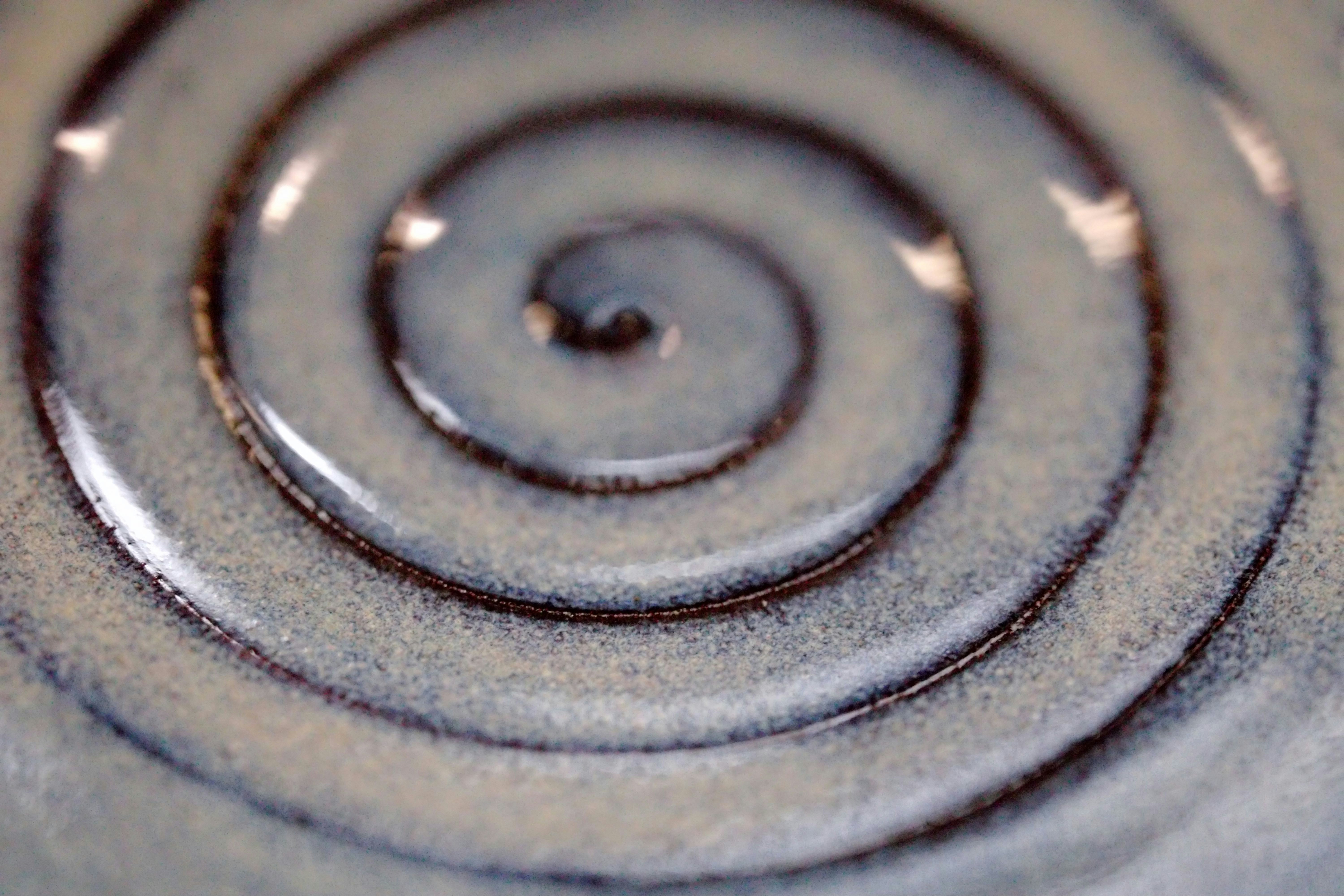Blue Spiral Macro: Center of a Glazed Ceramic Coil