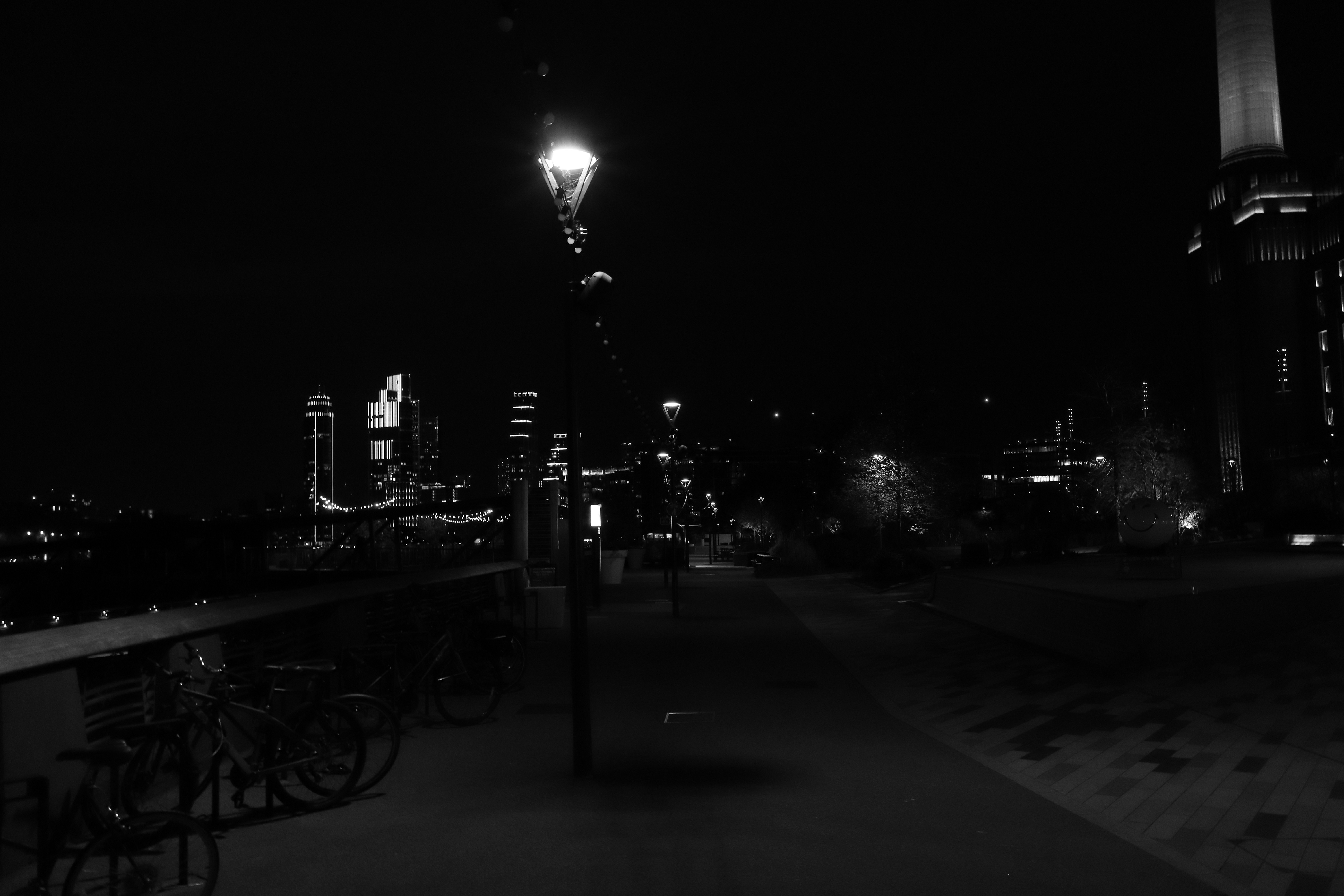 Night Walk Along the Silhouetted Waterfront