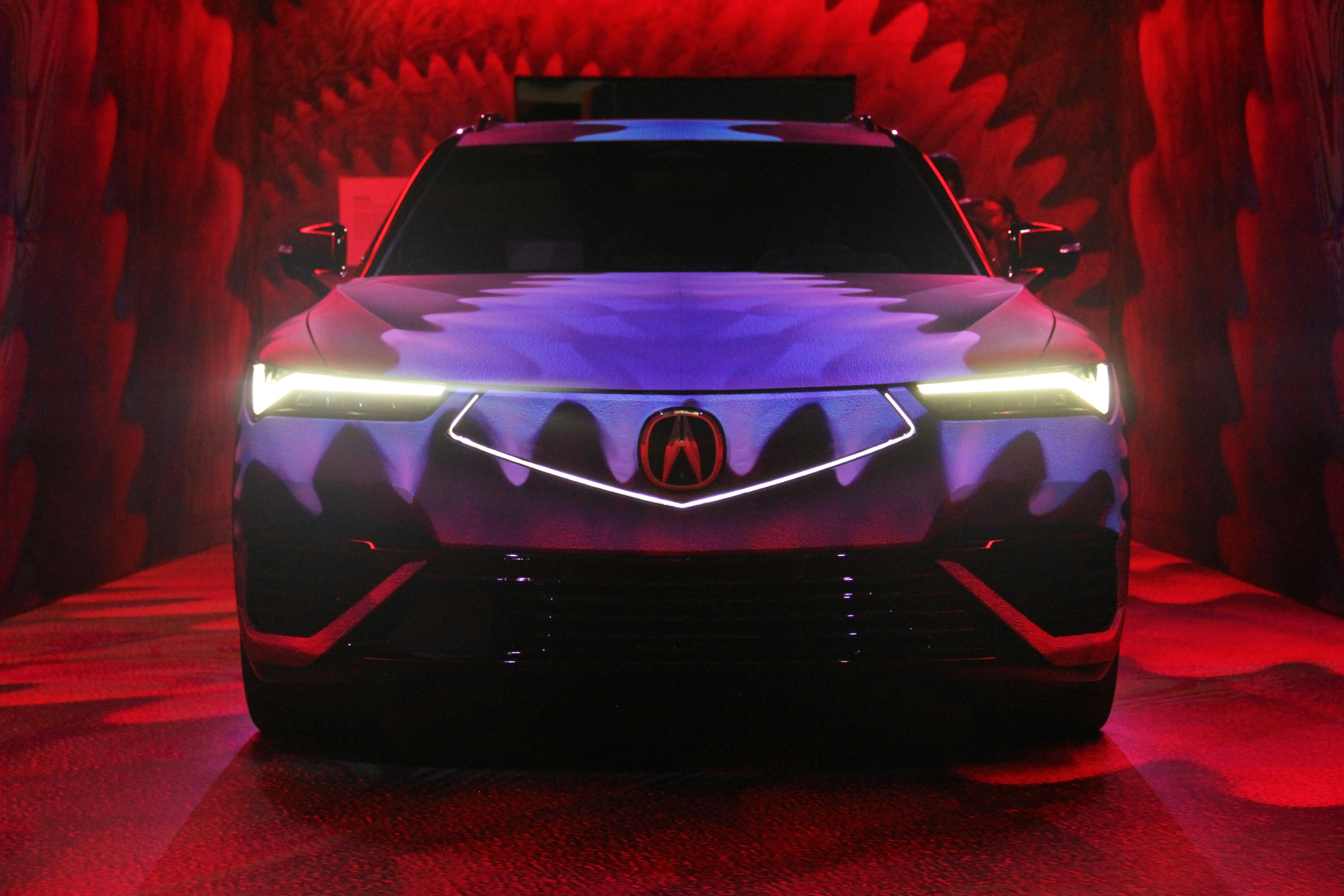 A car is shown with a red light behind it photo – Free Long beach Image ...