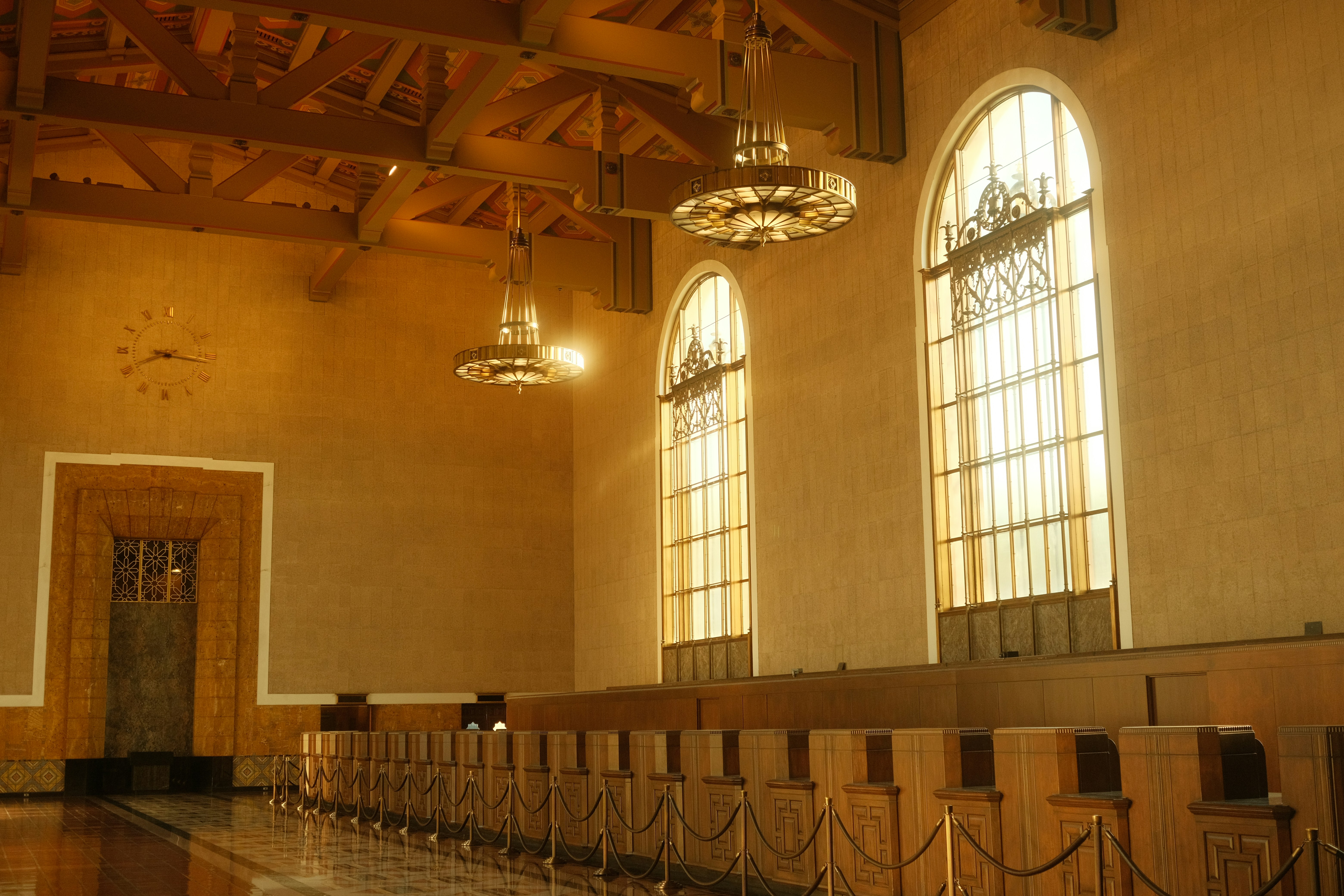A church with a row of pews and two large windows photo – Free Building ...