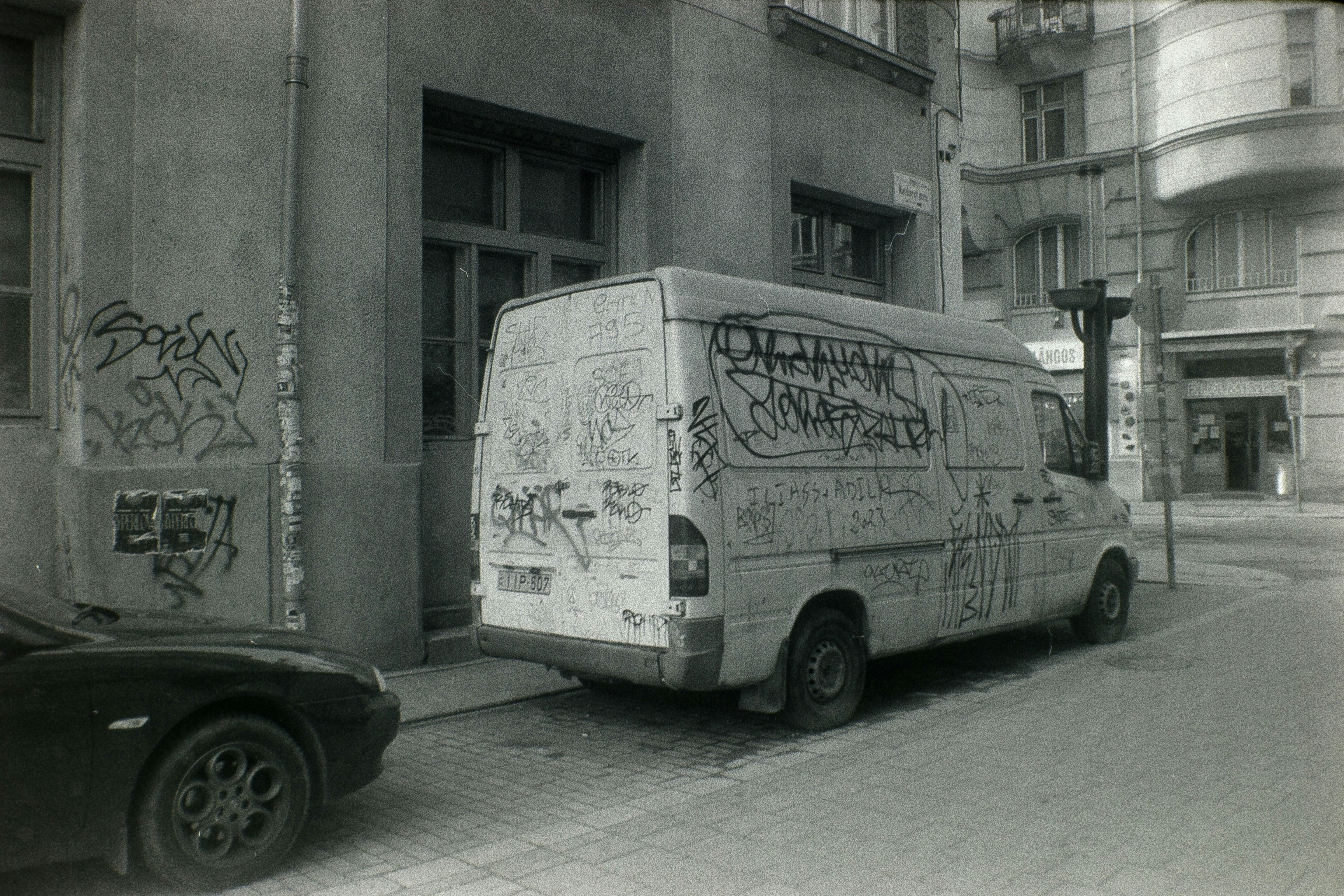 Graffiti-Blanketed Van Anchors a Quiet Street