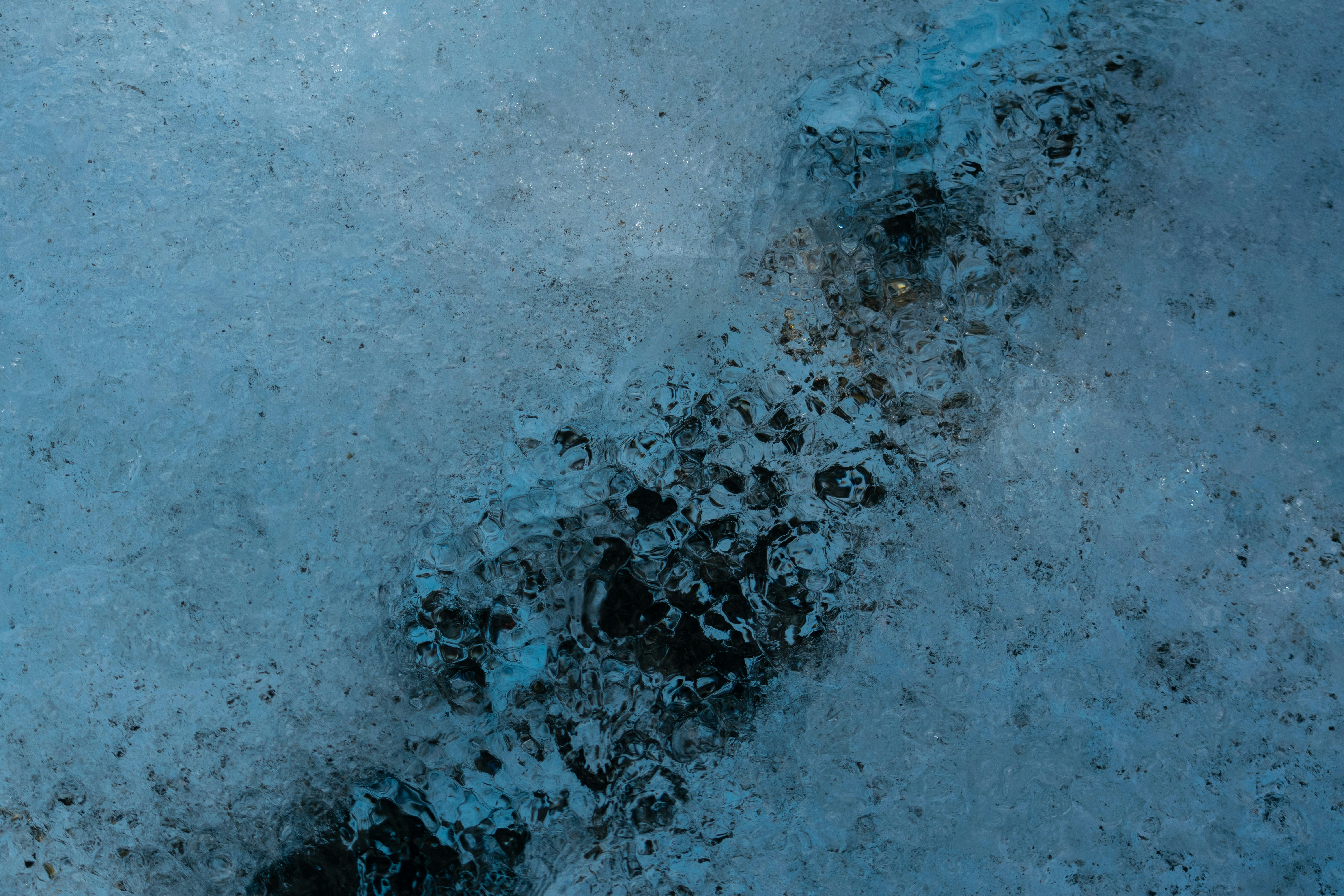 A close up of a blue substance in the water photo – Free #nature Image ...