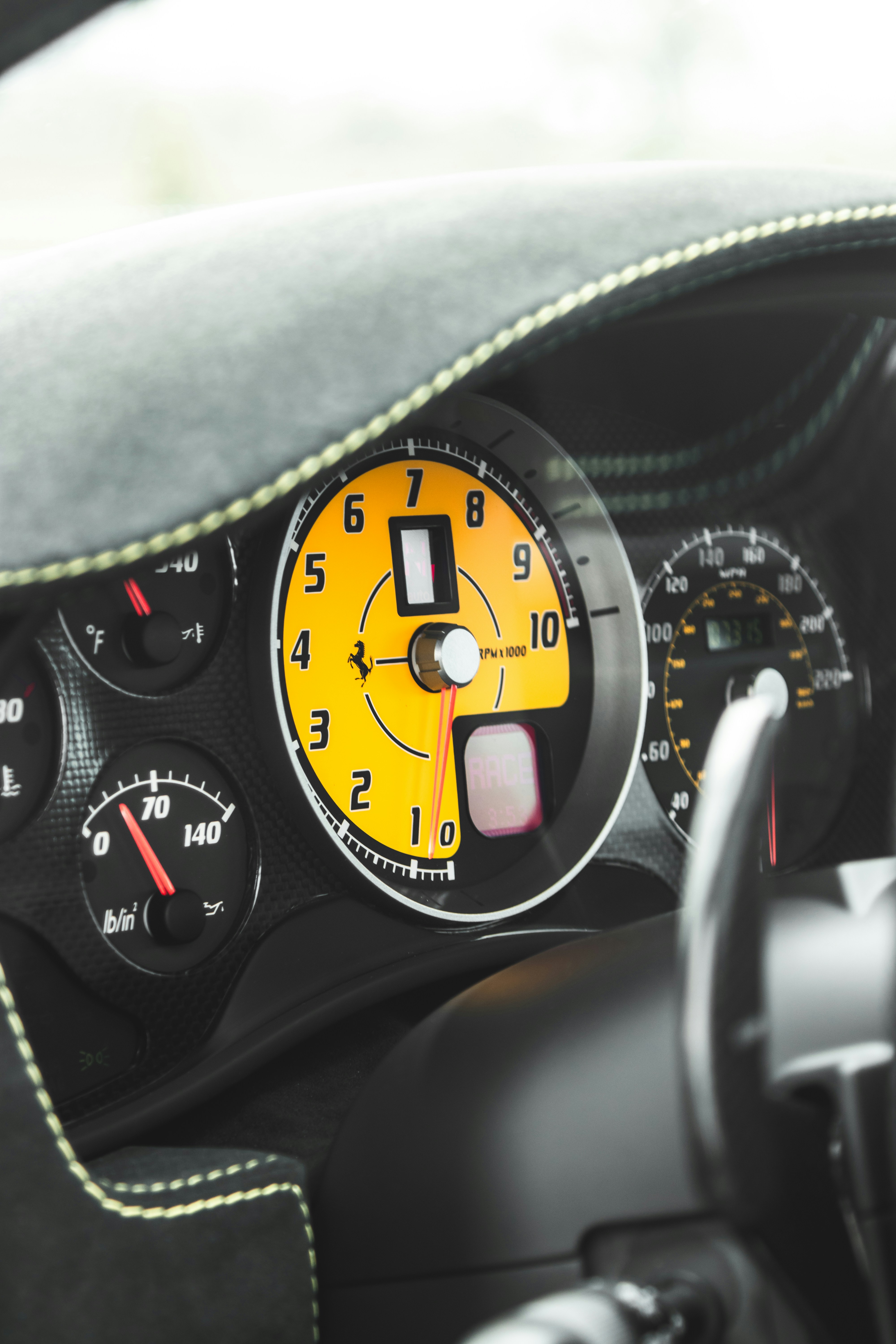 A close up of a car dashboard with a speedometer photo – Free Usa Image ...