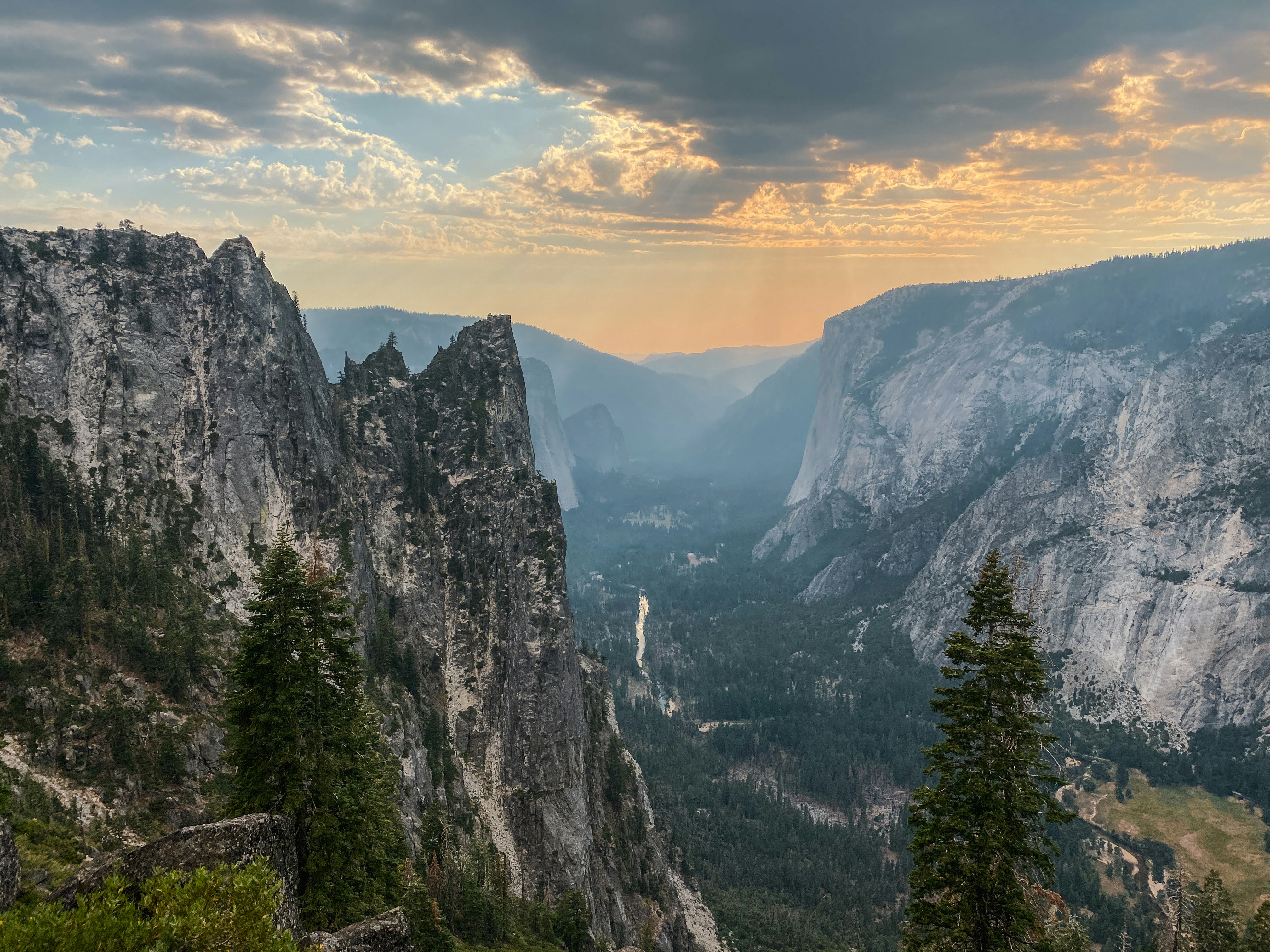 Dusk over a Granite Gorge: Valley Lights Between Peaks