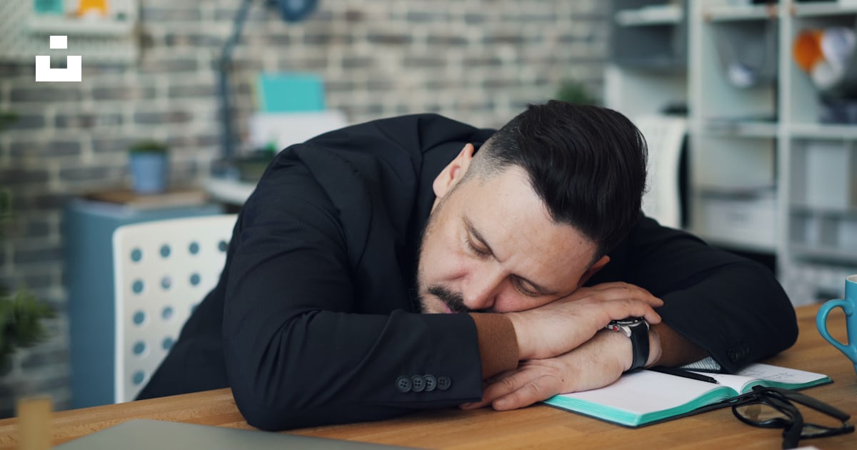 A man leaning his head on his desk photo – Free Head Image on Unsplash A man leaning his head on his desk photo – Free Head Image on Unsplash