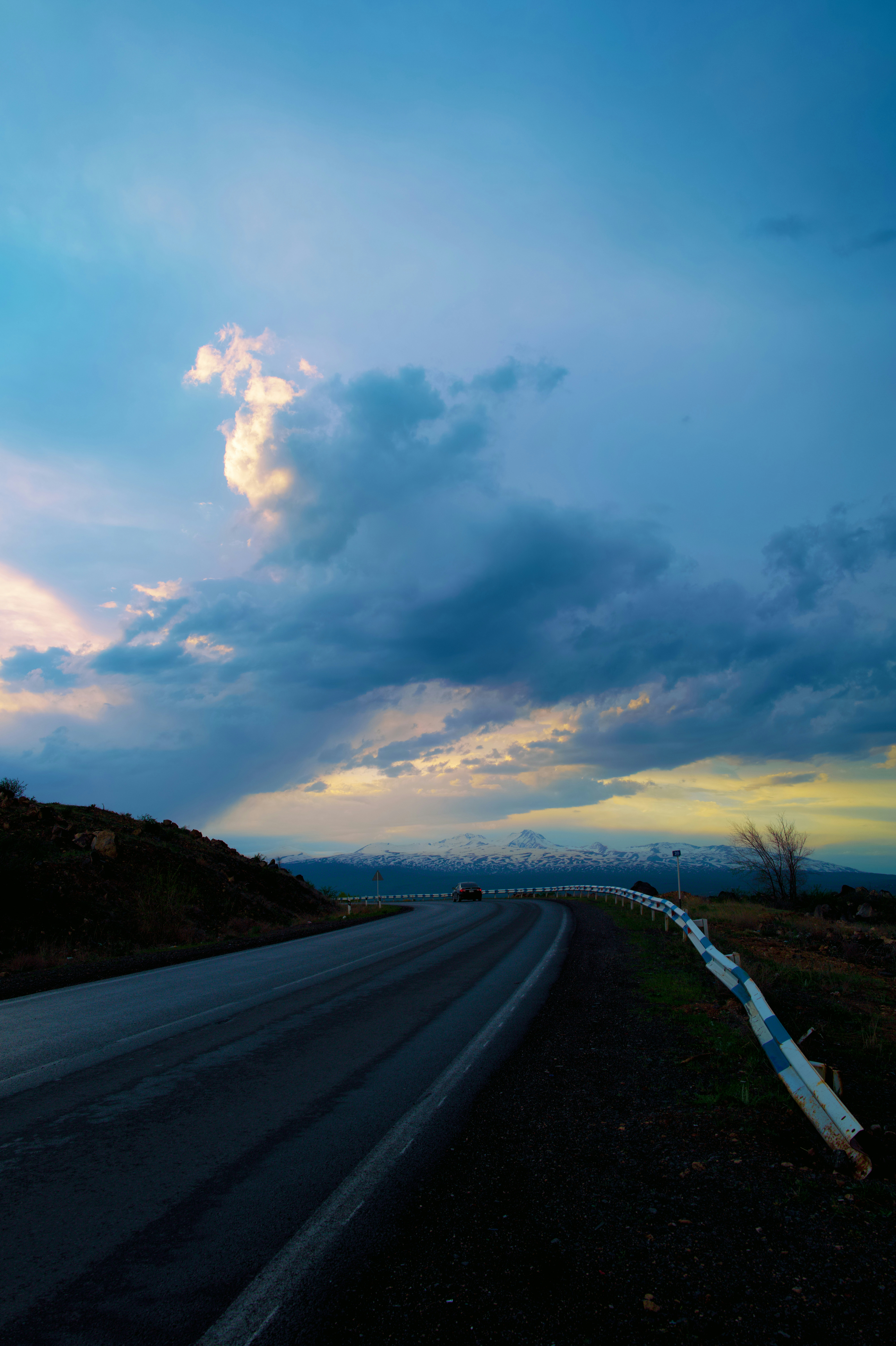A long road with a sky filled with clouds photo – Free Nature Image on ...