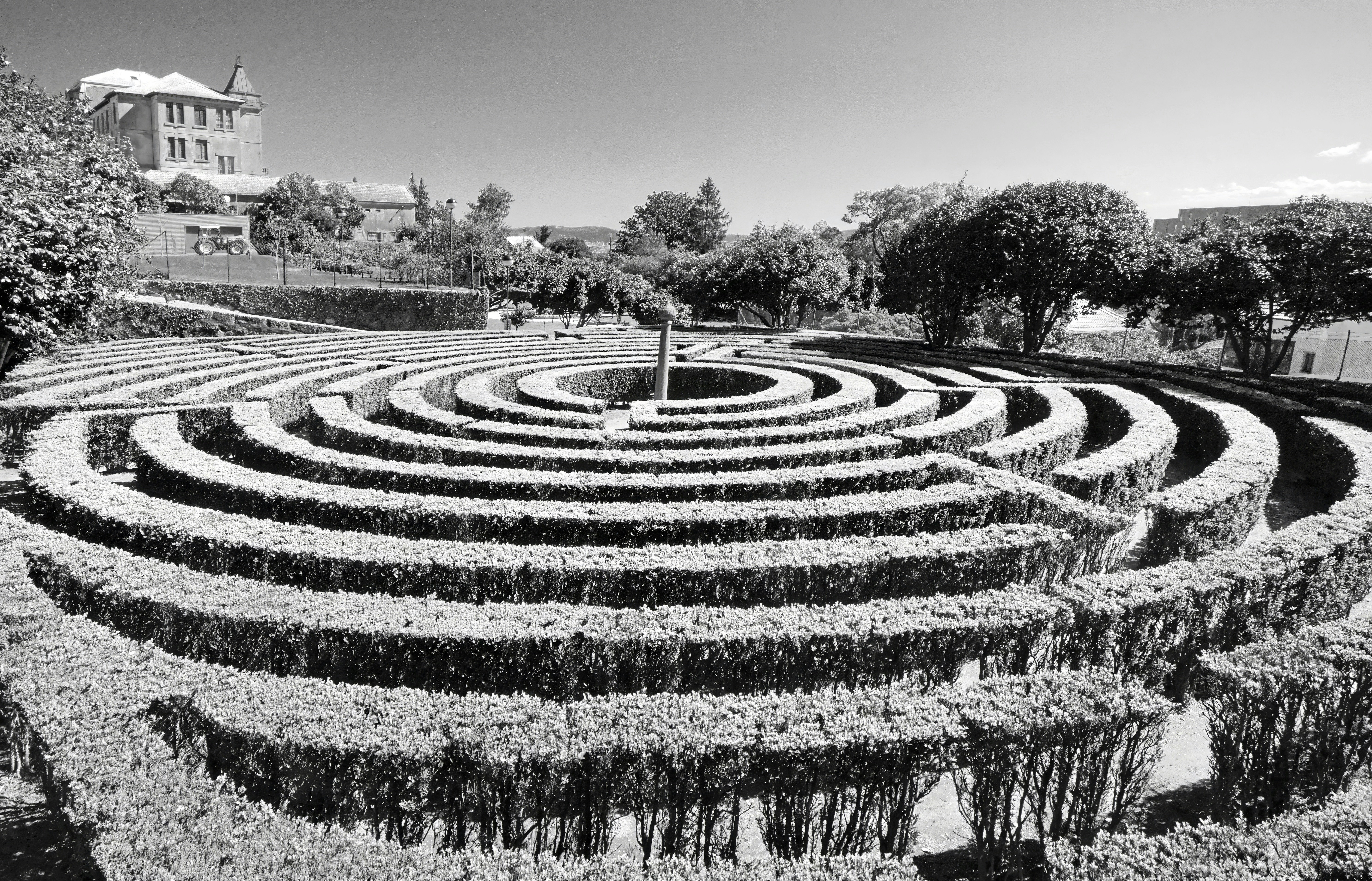 A big round maze in a park in Porto, Portugal. Black and white picture.