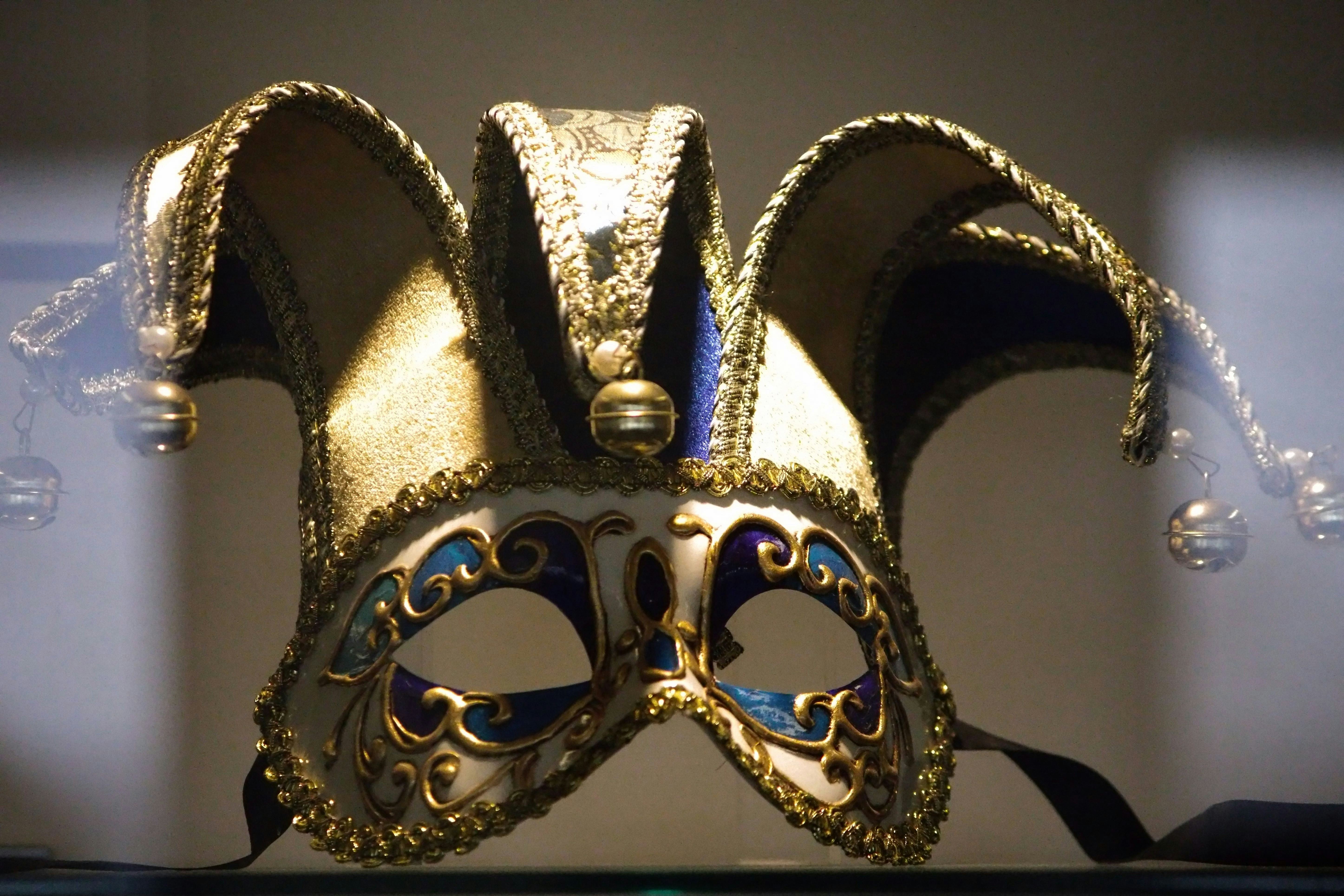 A masquerade mask on display in a museum photo – Free Maque Image on ...